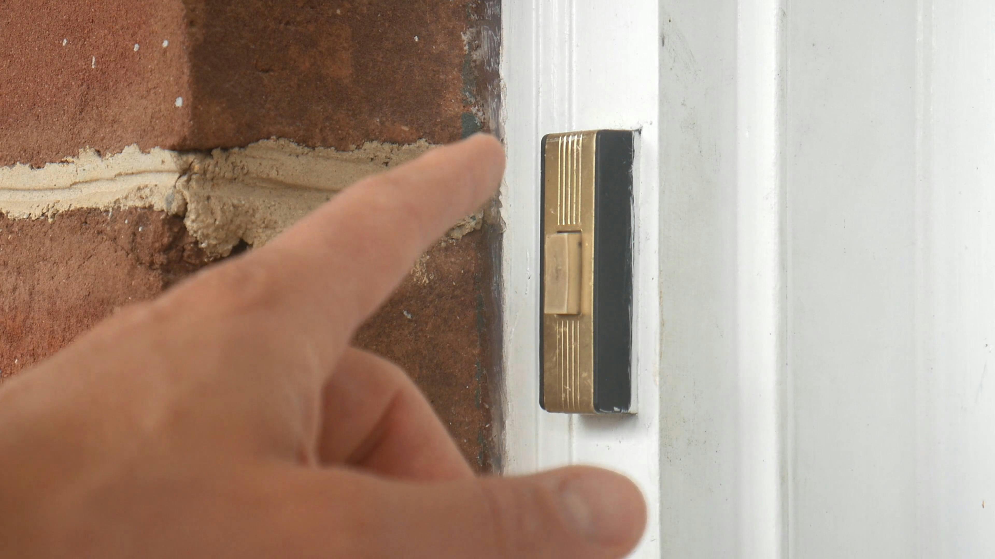 Person Ringing a Doorbell · Free Stock Video