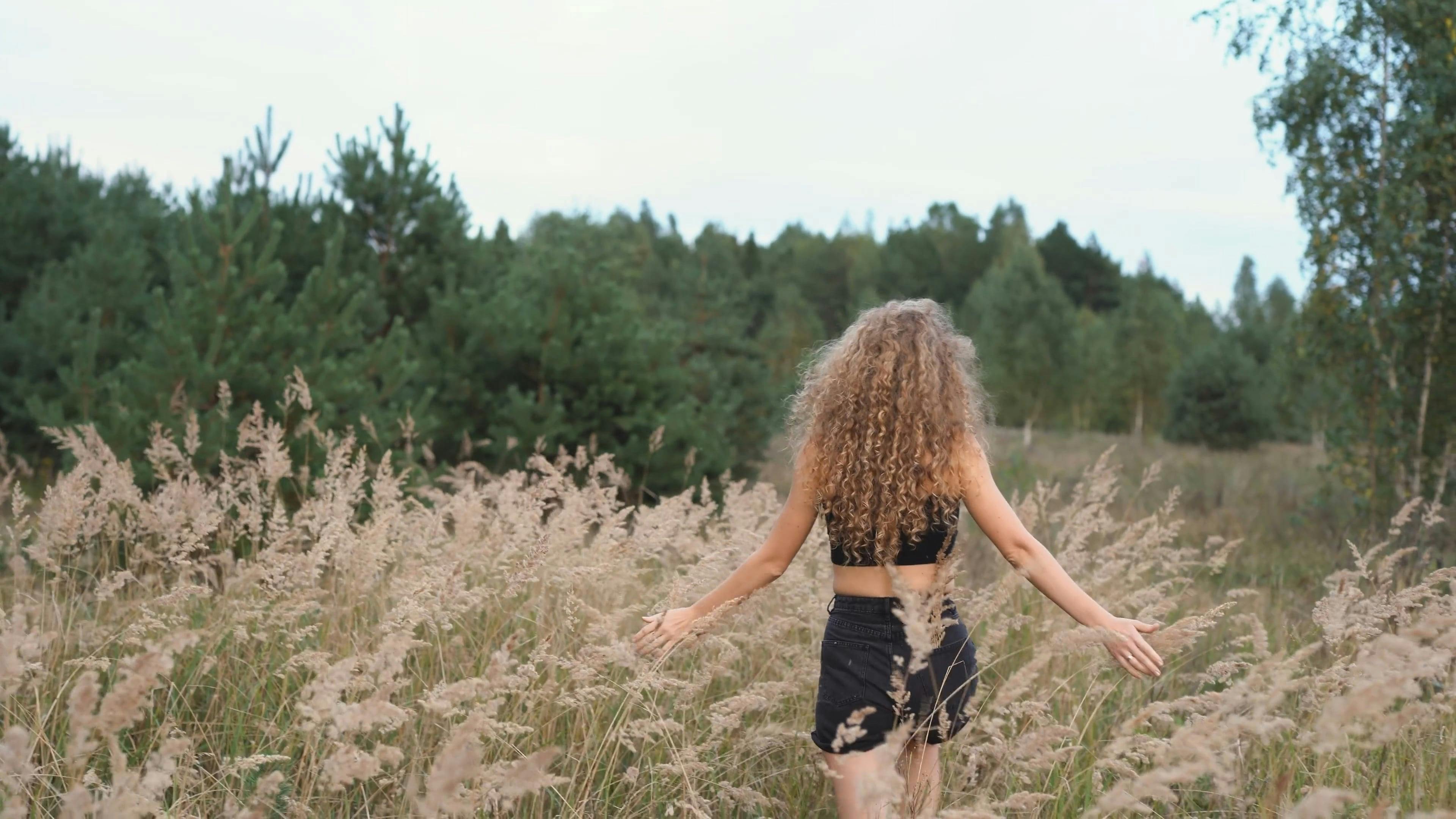 Woman Walking on the Grass Field Free Stock Video Footage, Royalty-Free ...