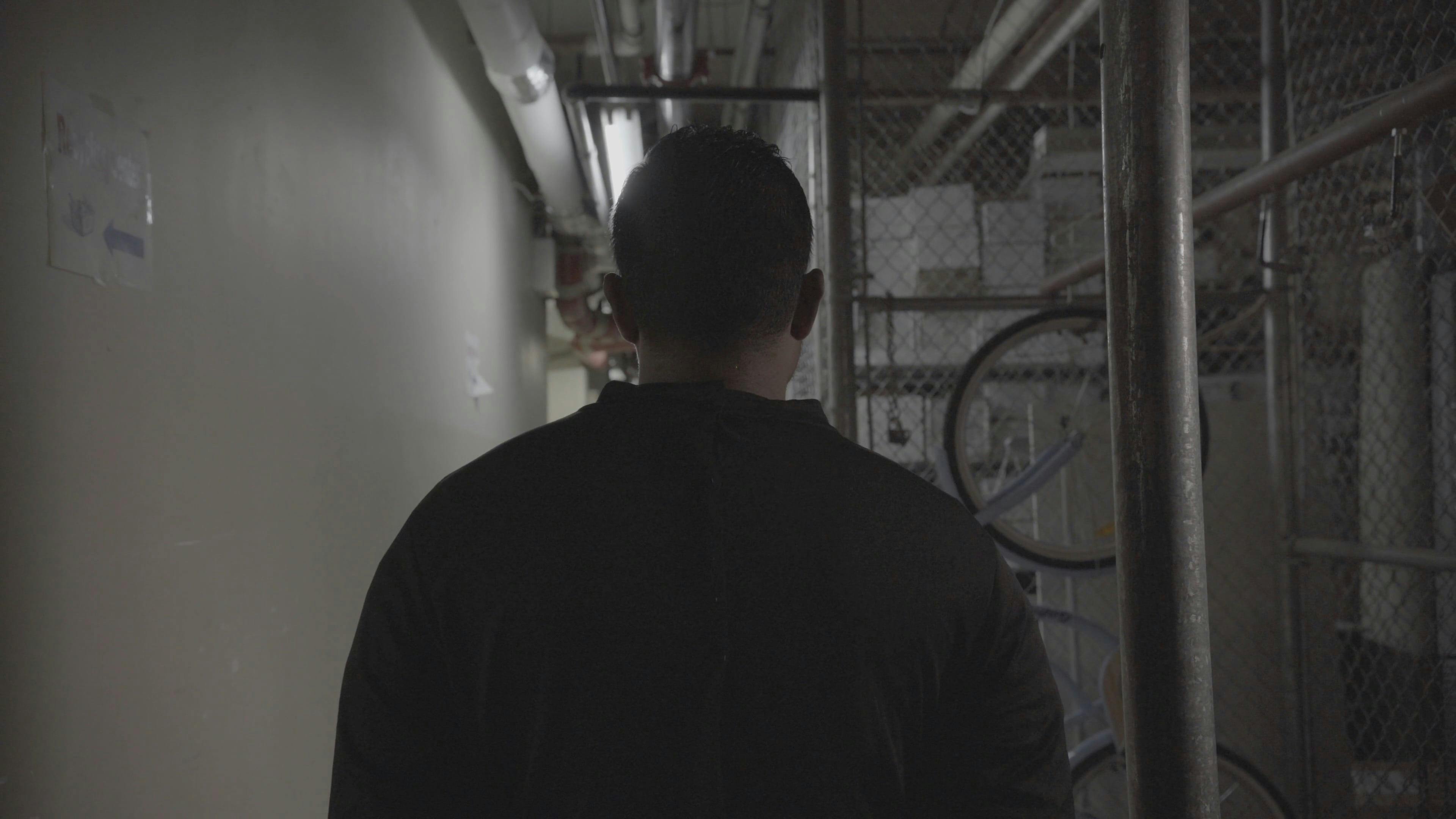 Back View of Man Walking in Basement Corridor Free Stock Video Footage ...