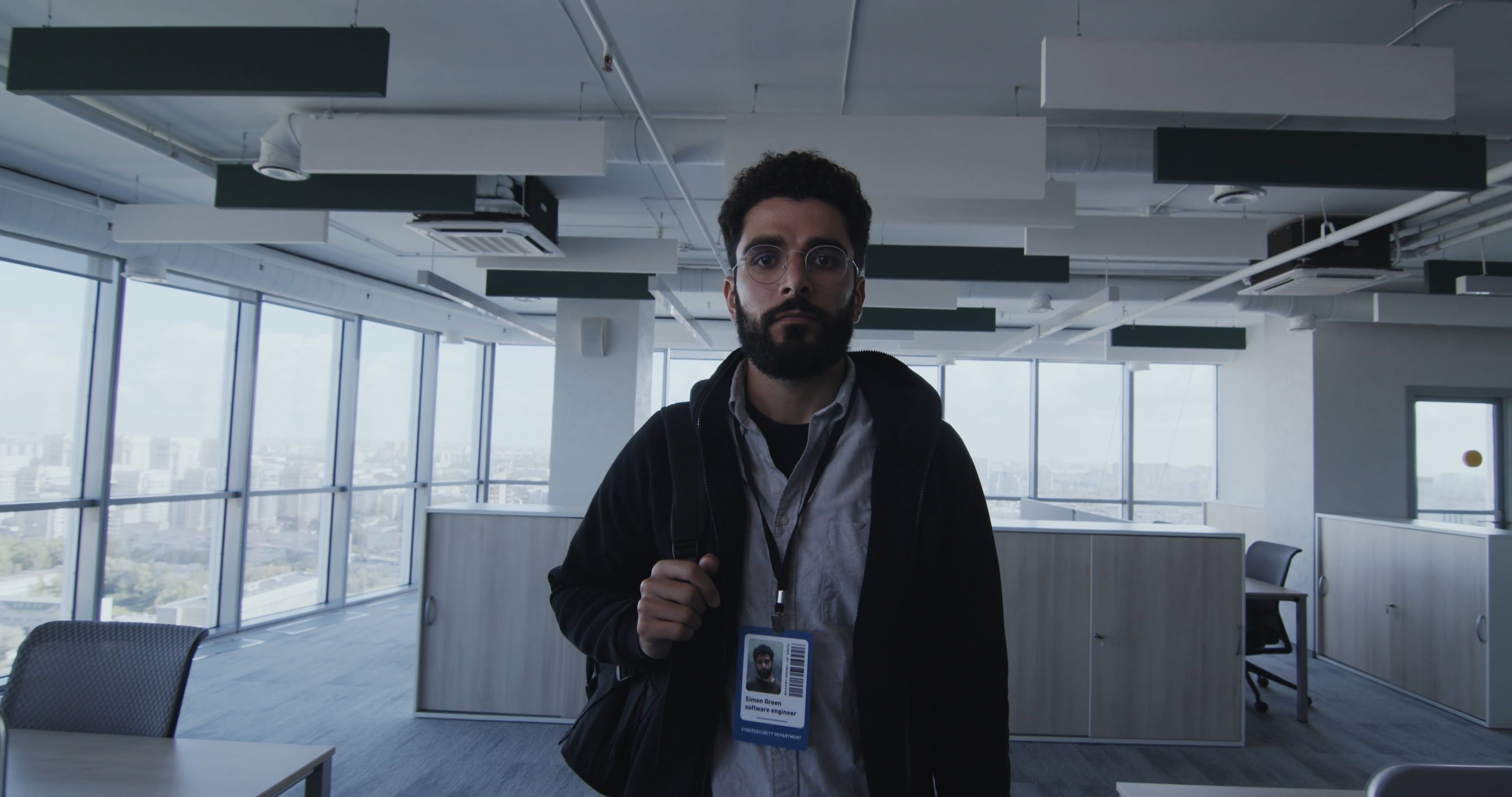 A Man Walking Alone in an Empty Office · Free Stock Video