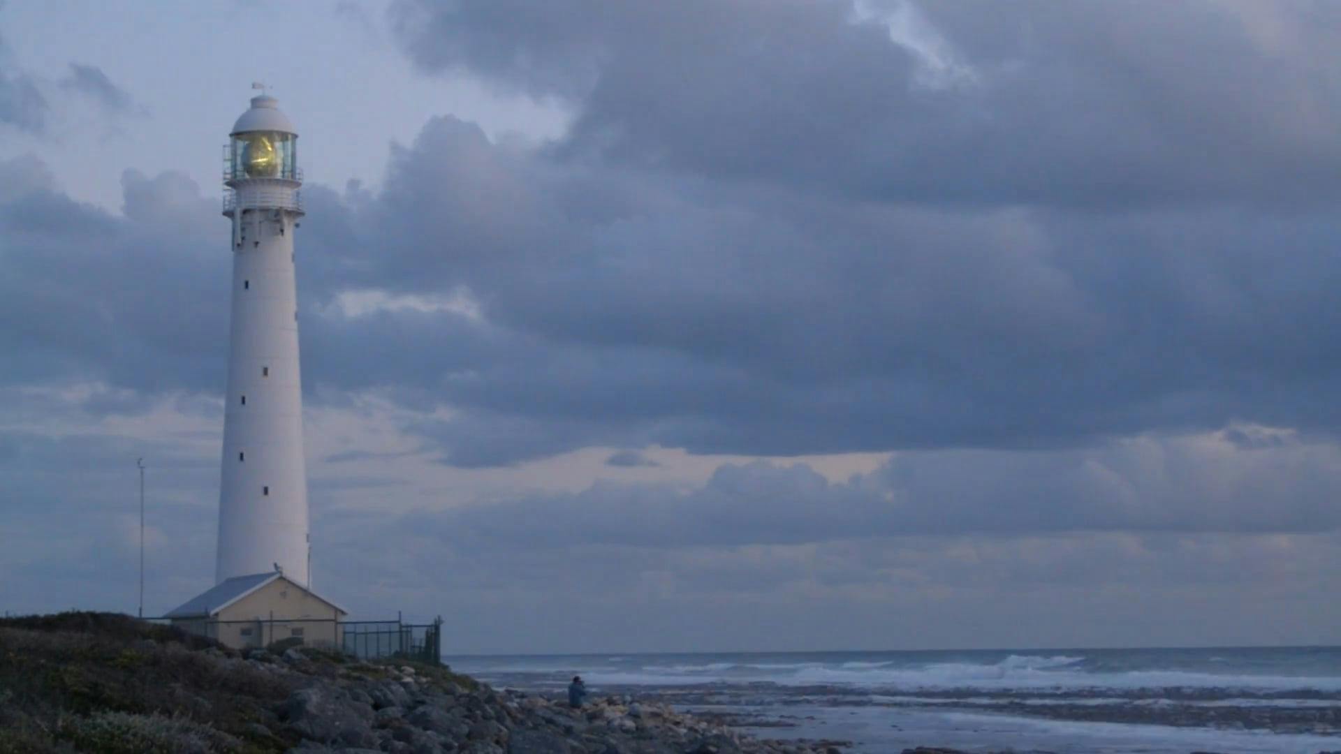 Time-Lapse Video of a Lighthouse Under Cloudy Sky · Free Stock Video