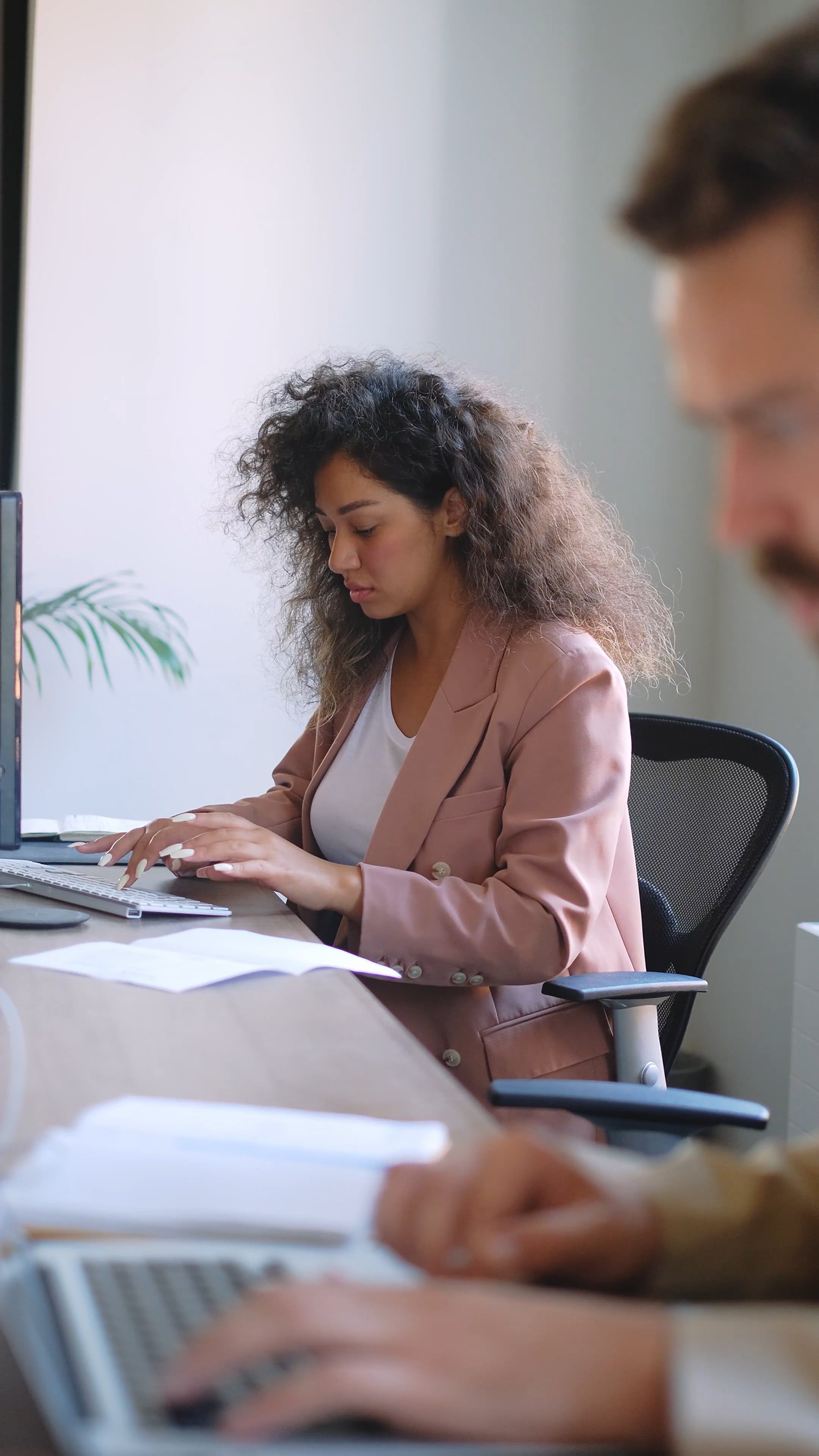 A Woman Handing out a Paper to her Coworker Free Stock Video Footage ...
