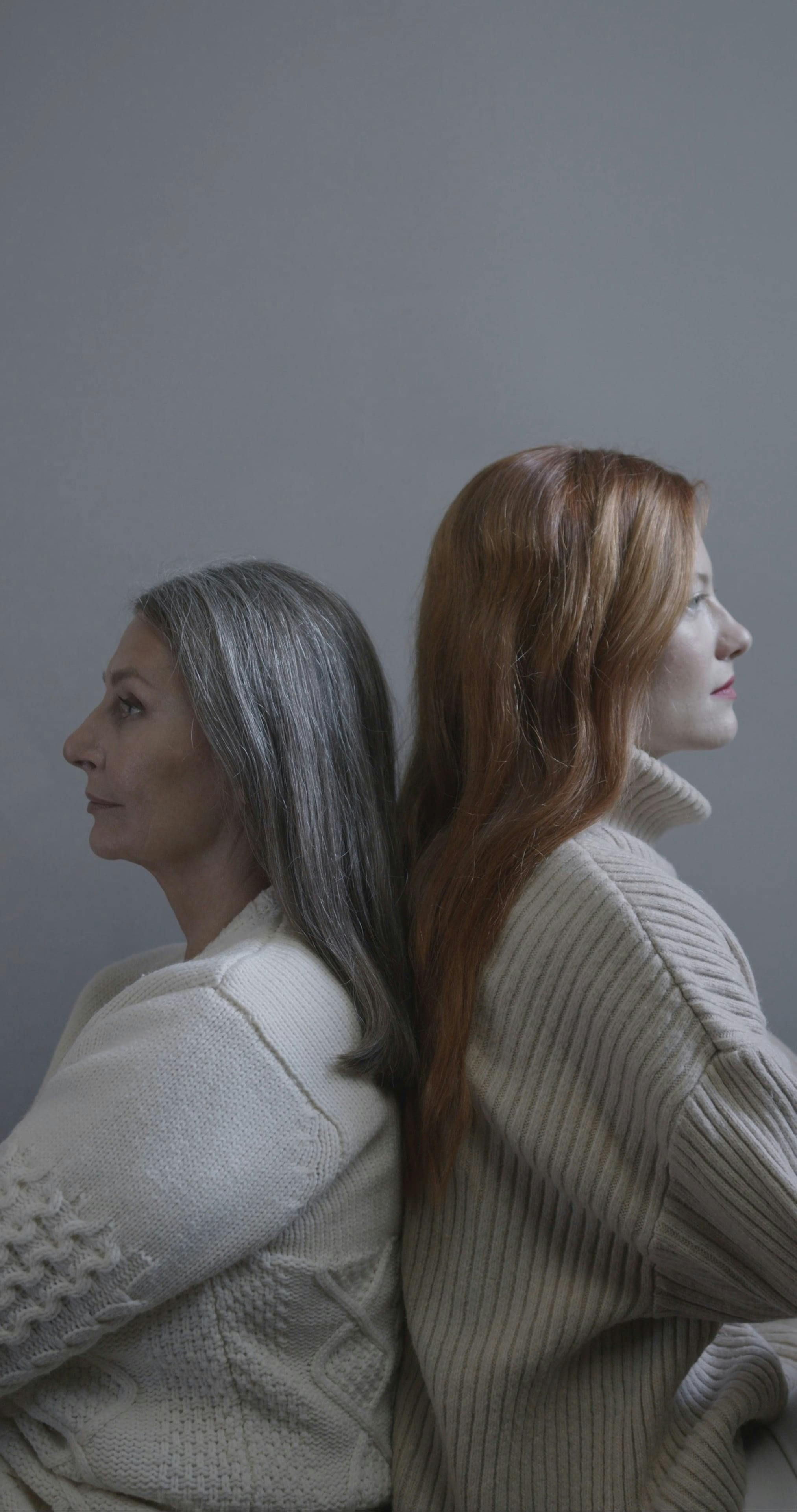 Two Women In A Back To Back Position · Free Stock Video