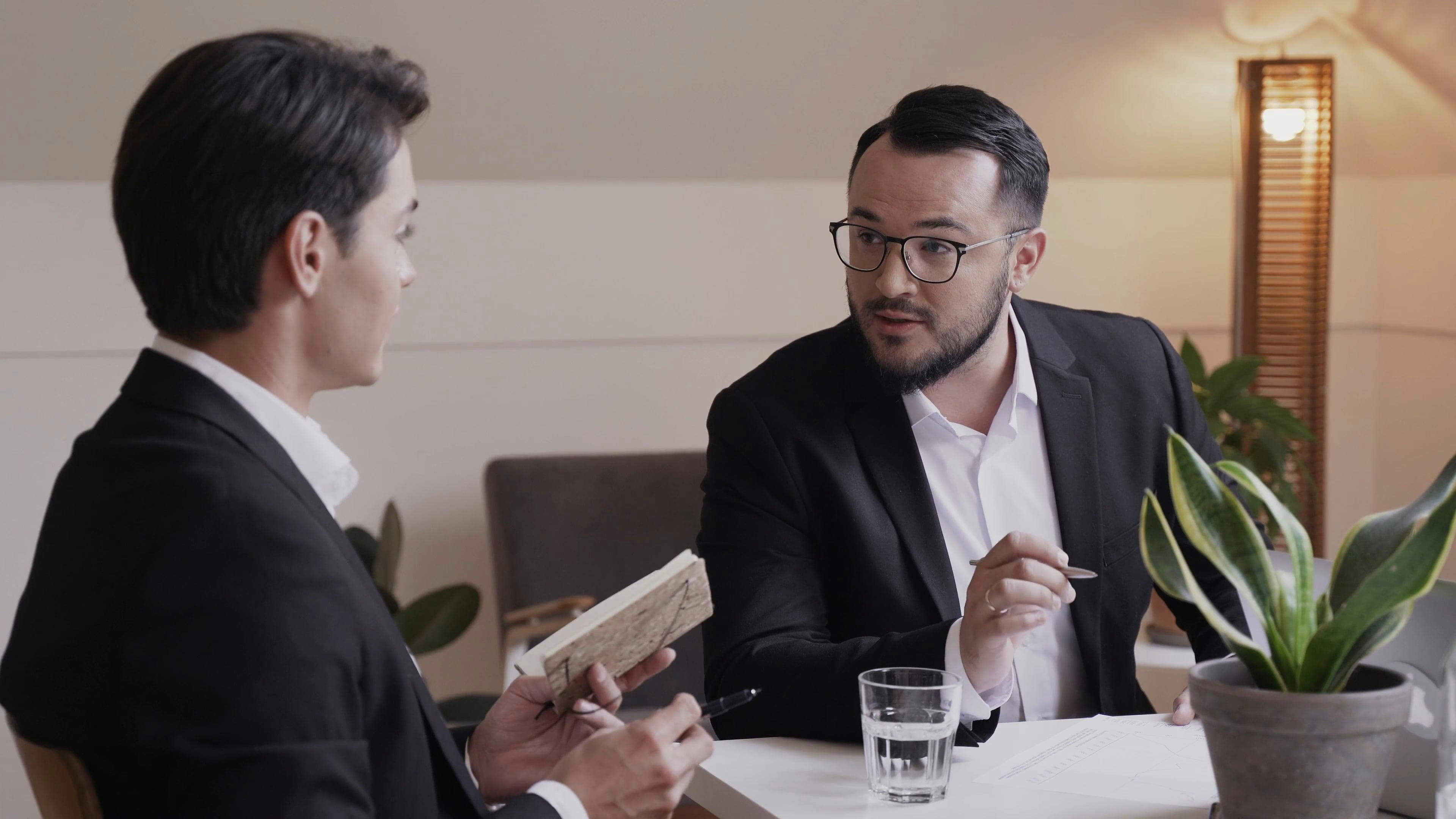 People Discussing in a Meeting · Free Stock Video