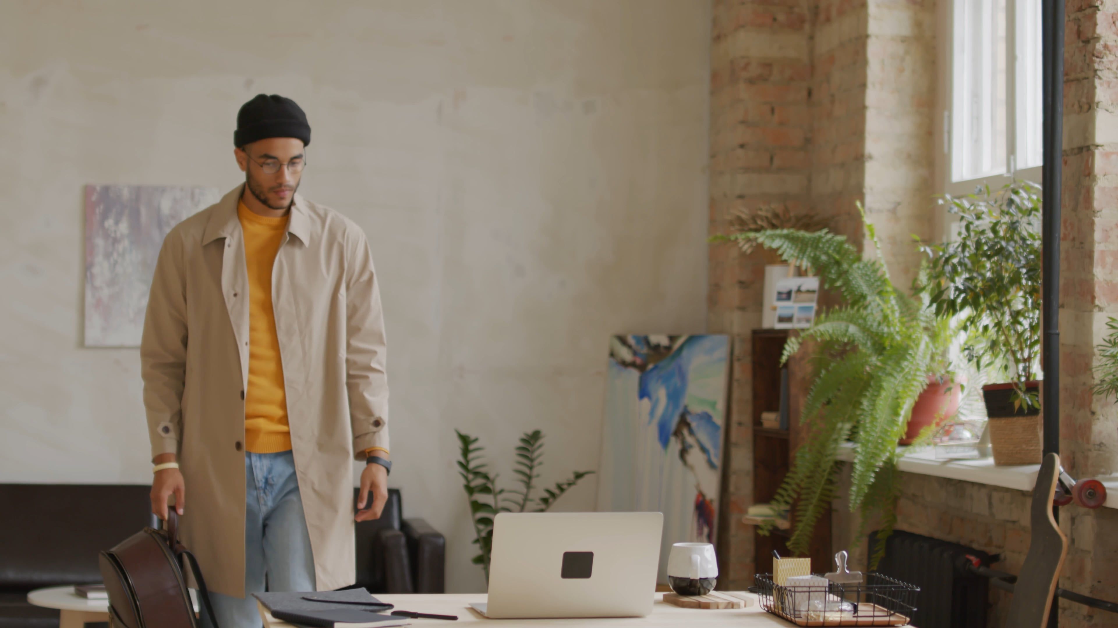 A Man Putting Laptop on His Bag · Free Stock Video