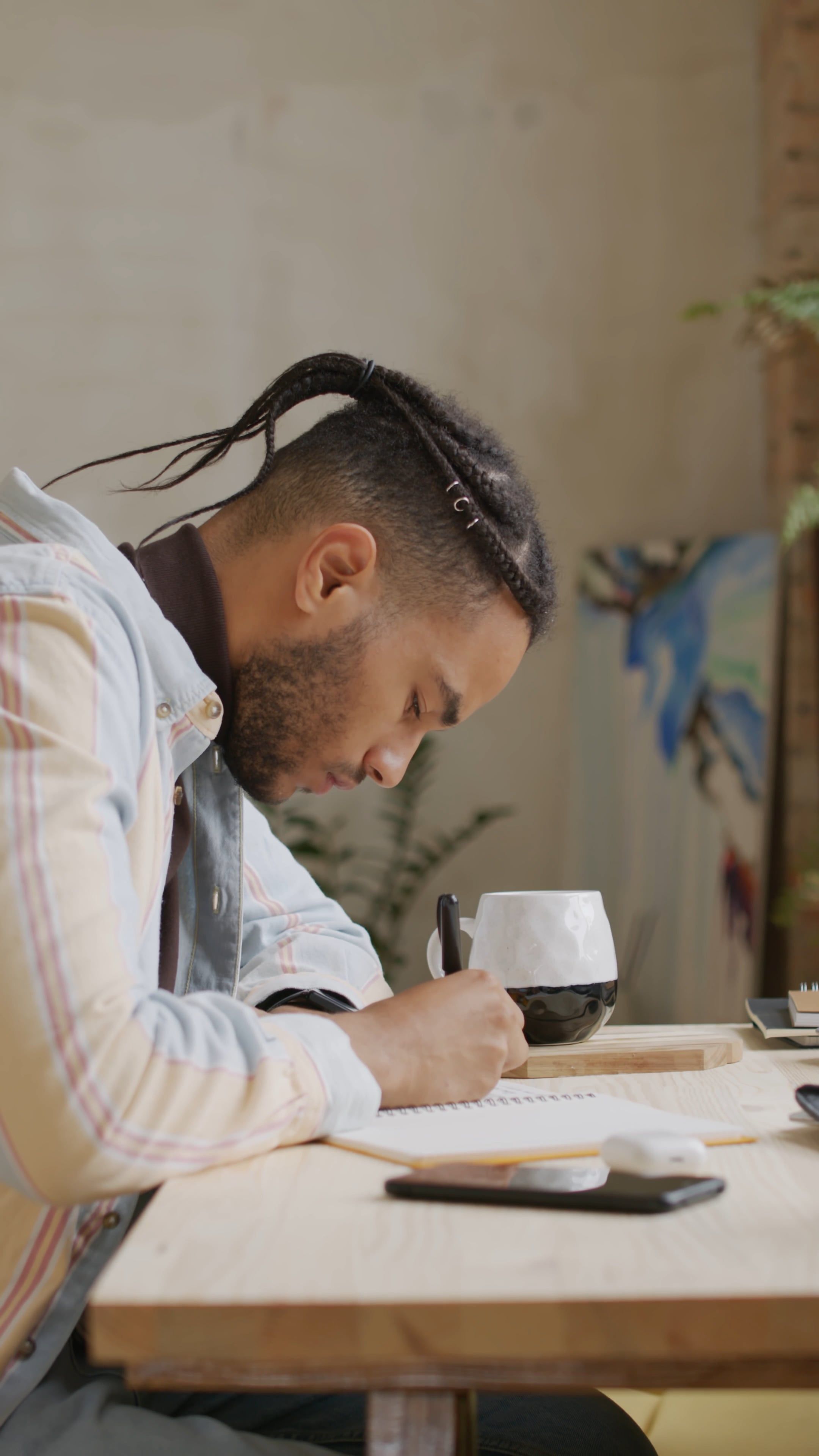 A Man Writing on the Notebook · Free Stock Video