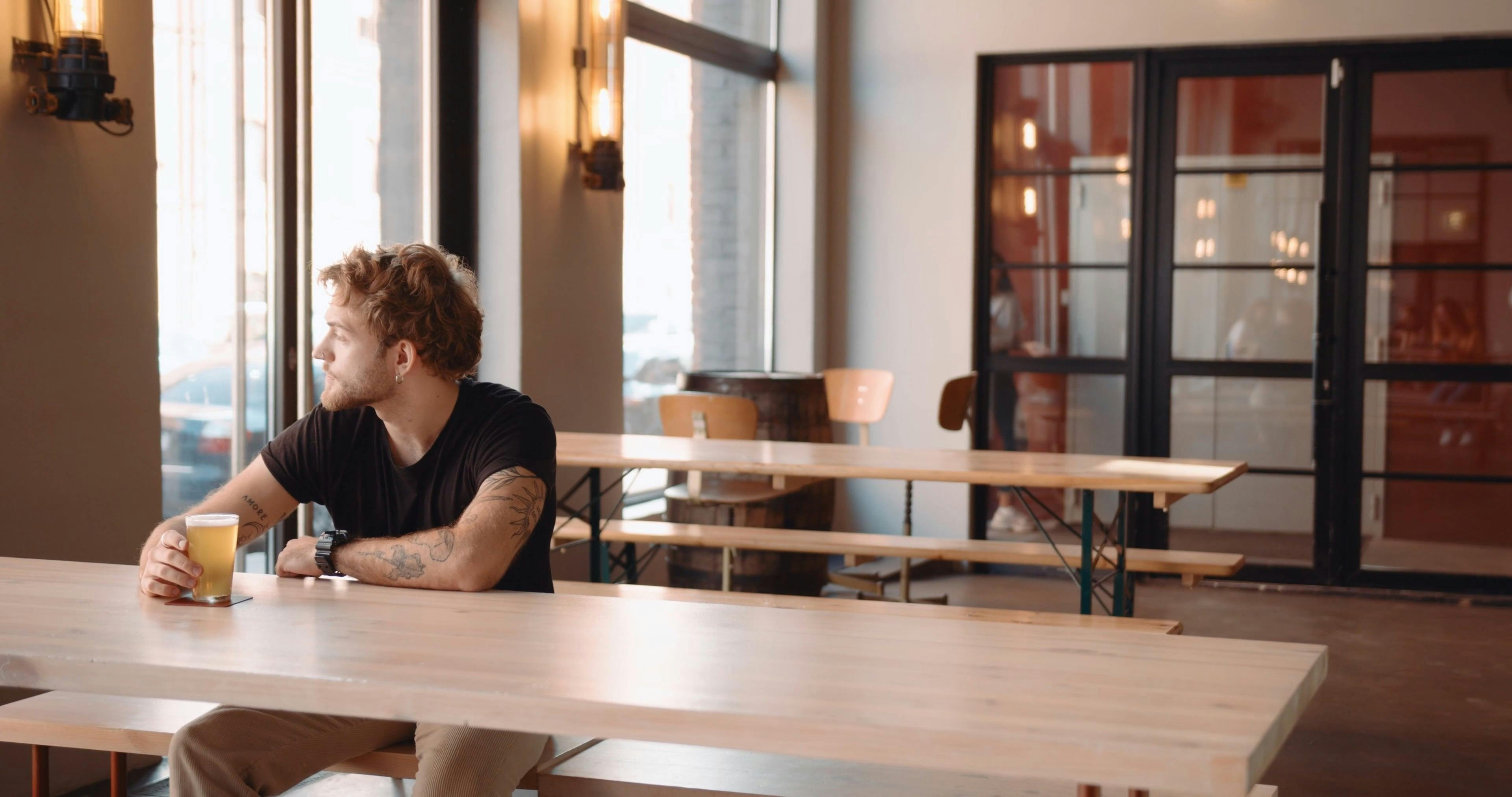 A Man Waiting Alone While Having A Beer Free Stock Video Footage ...