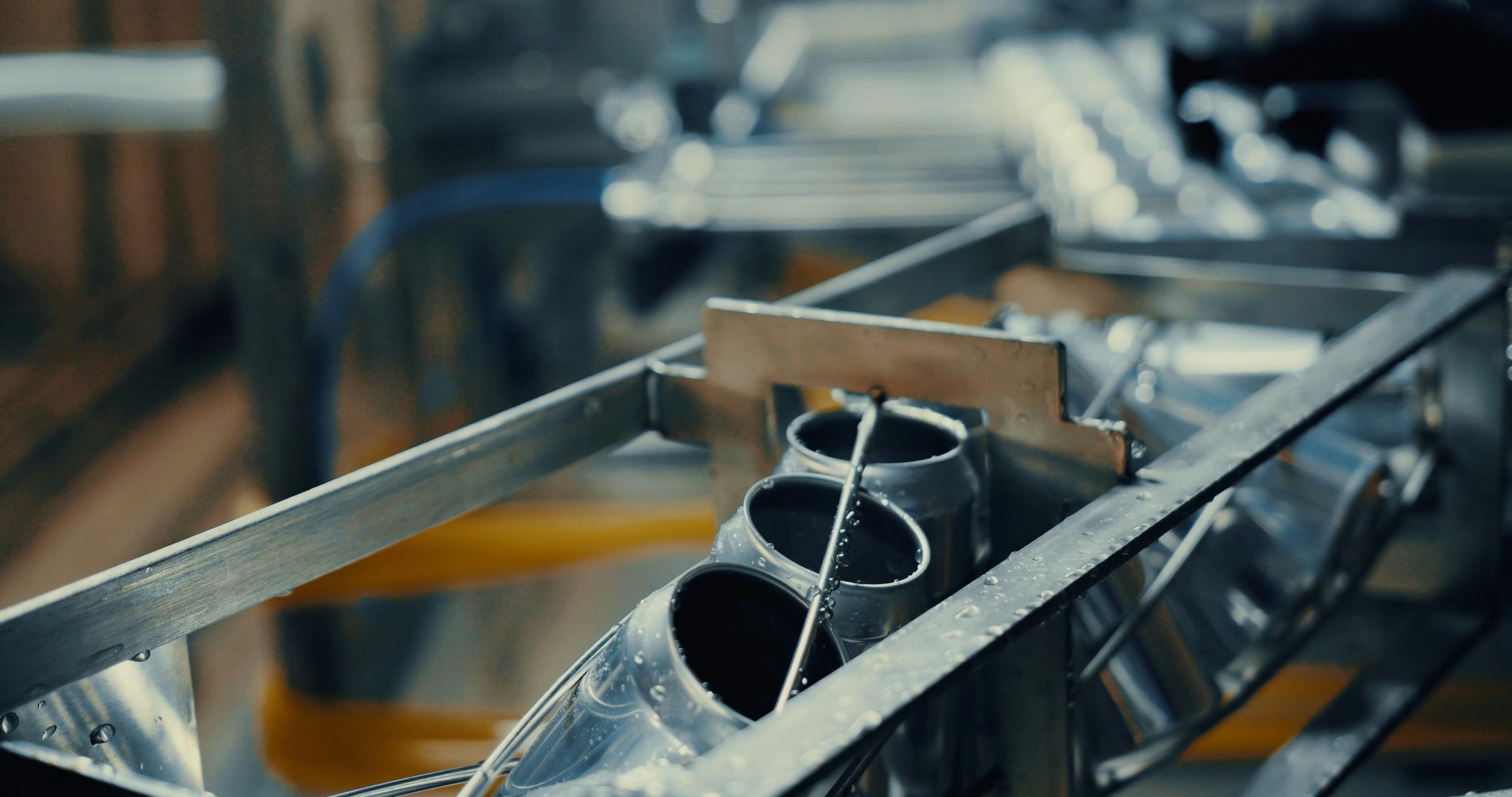 Tin Cans Line Up In The Production Line Inside A Brewery · Free Stock Video