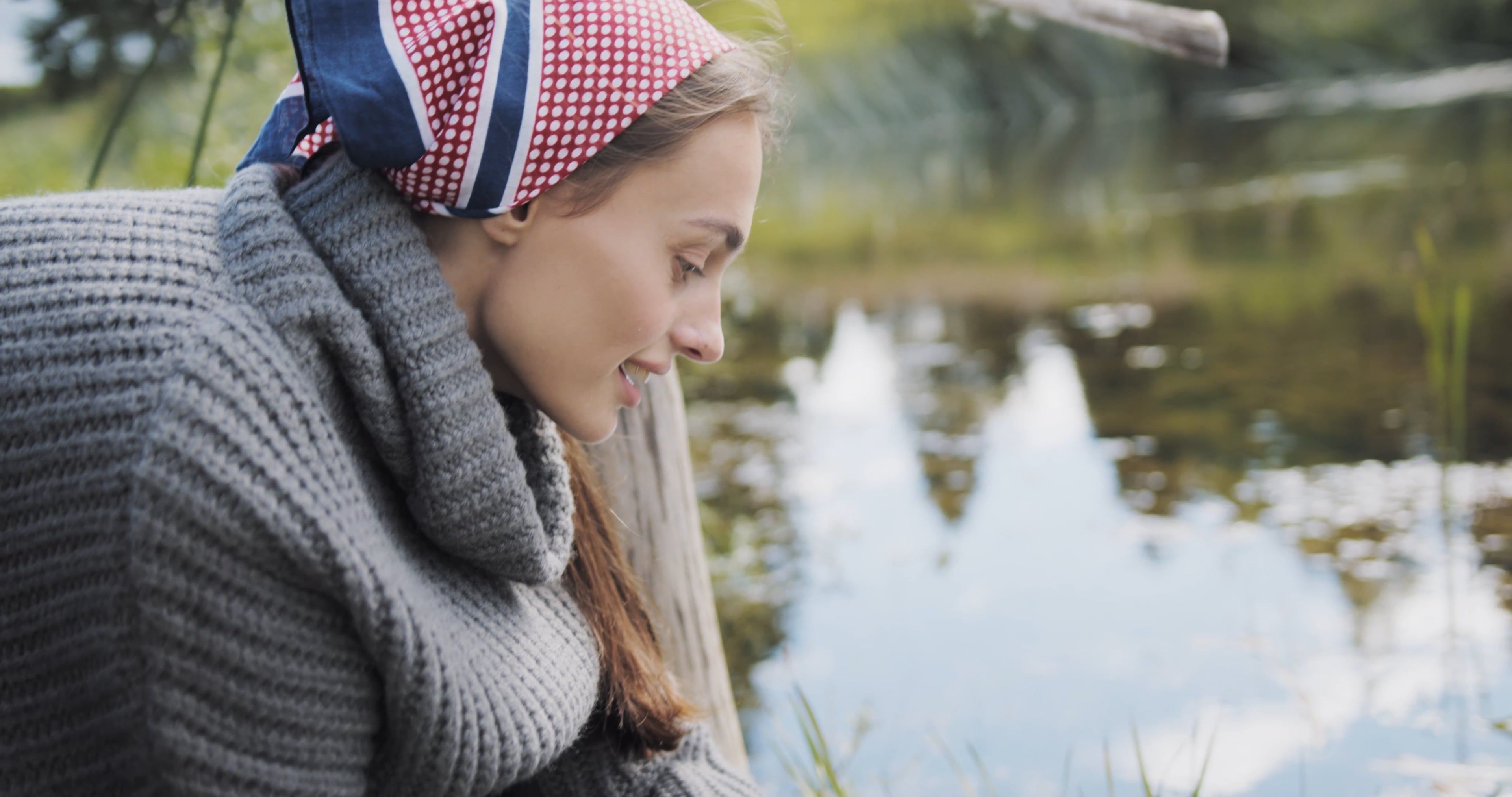Women Getting a Water on the River · Free Stock Video