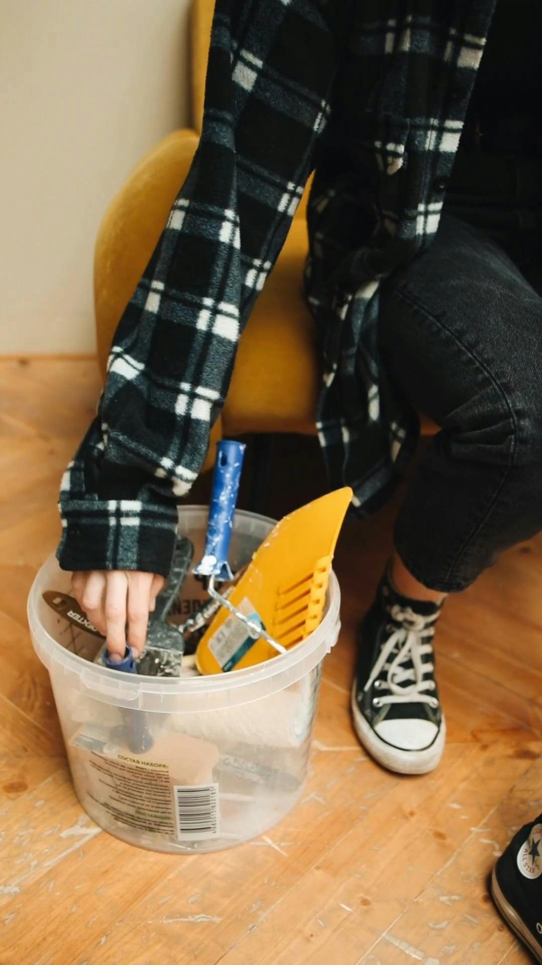 Person Picking Up a Putty Knife from a Bucket Free Stock Video Footage ...