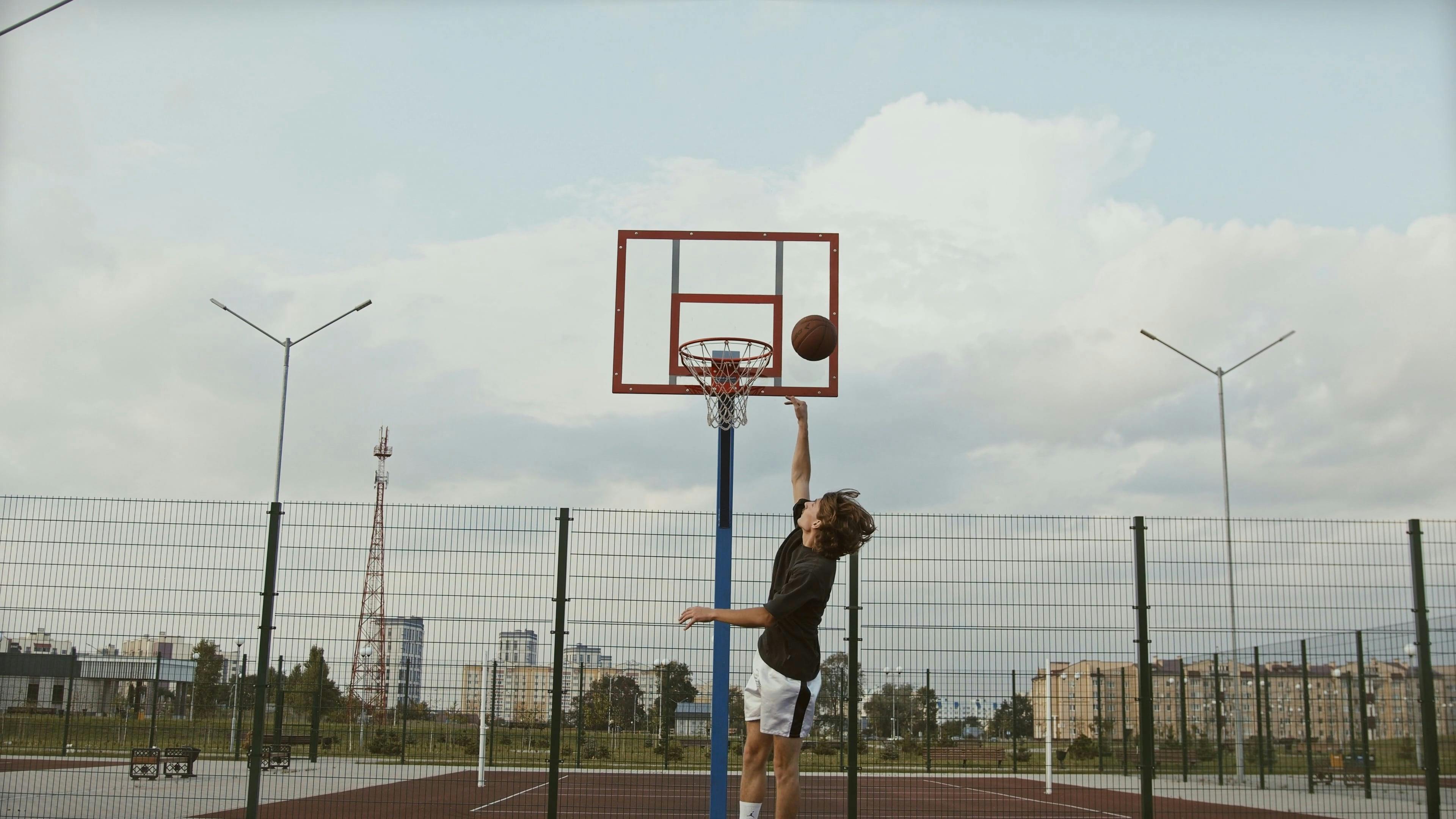 Guy Scoring Point in a Basketball Game · Free Stock Video