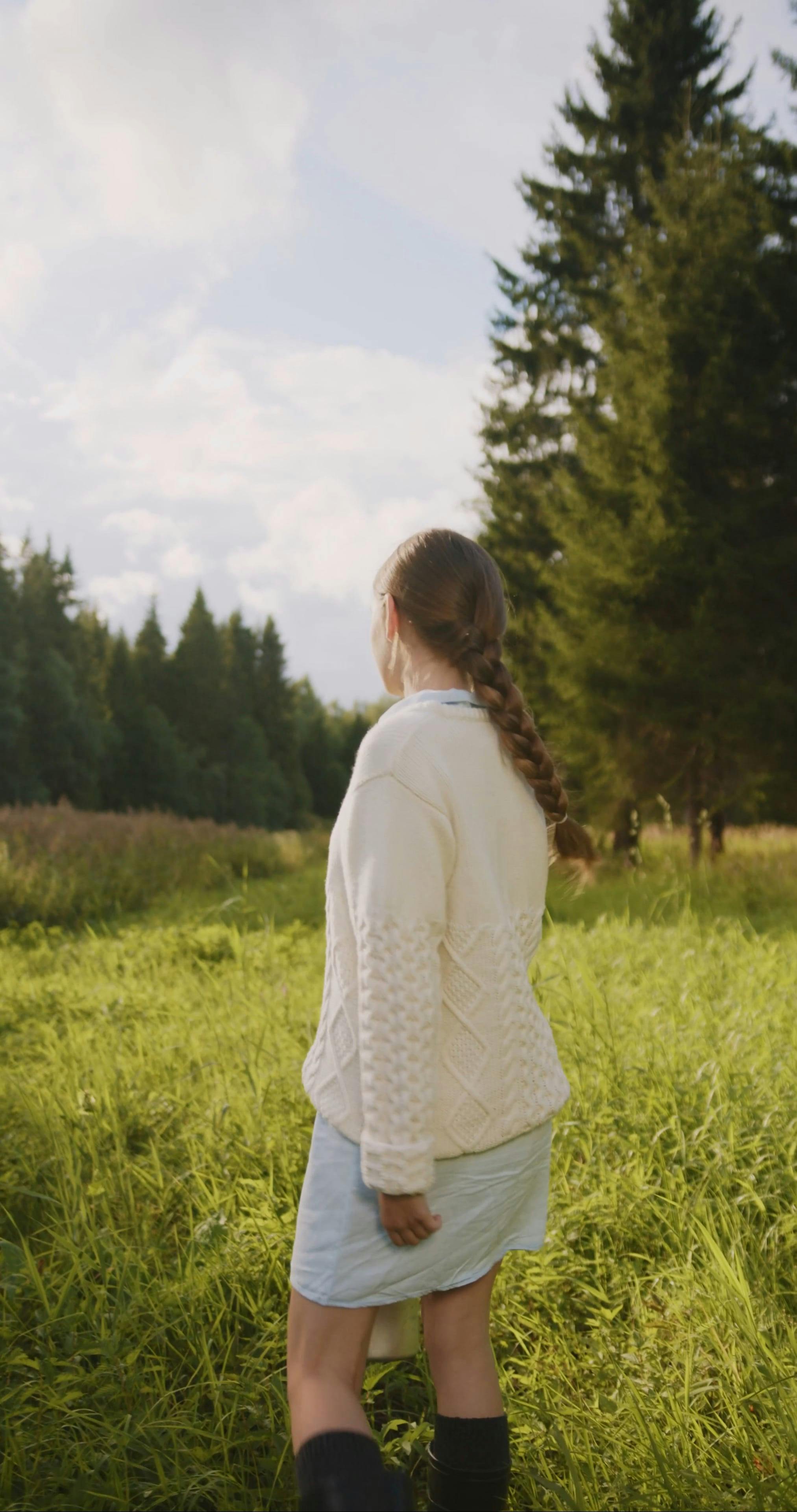 A Young Woman Walking on the Grass Field Free Stock Video Footage ...