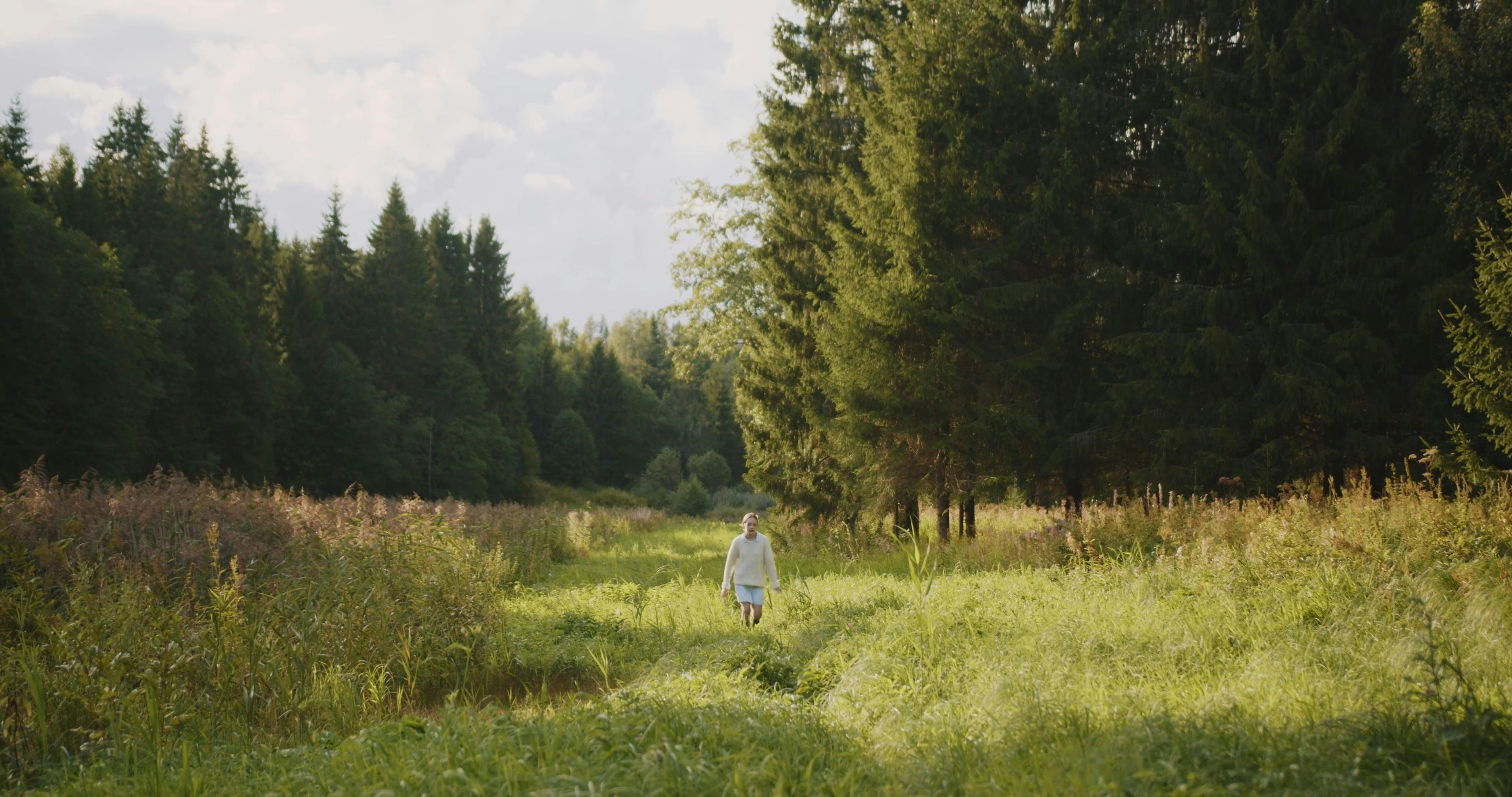 Footage Of A Woman Running In The Field Full Of Flowers · Free Stock Video