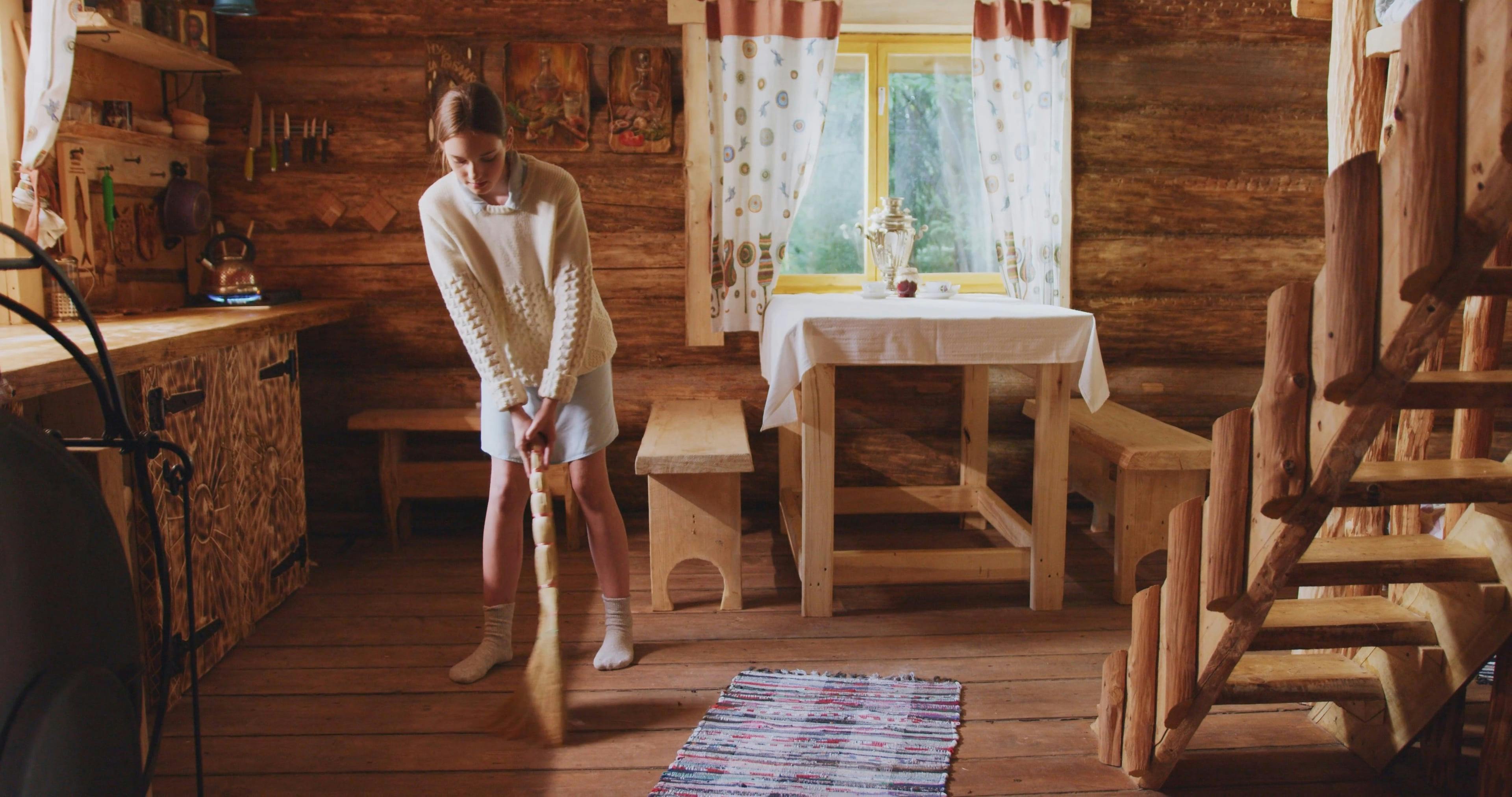 Girl Sweeping the Floor · Free Stock Video