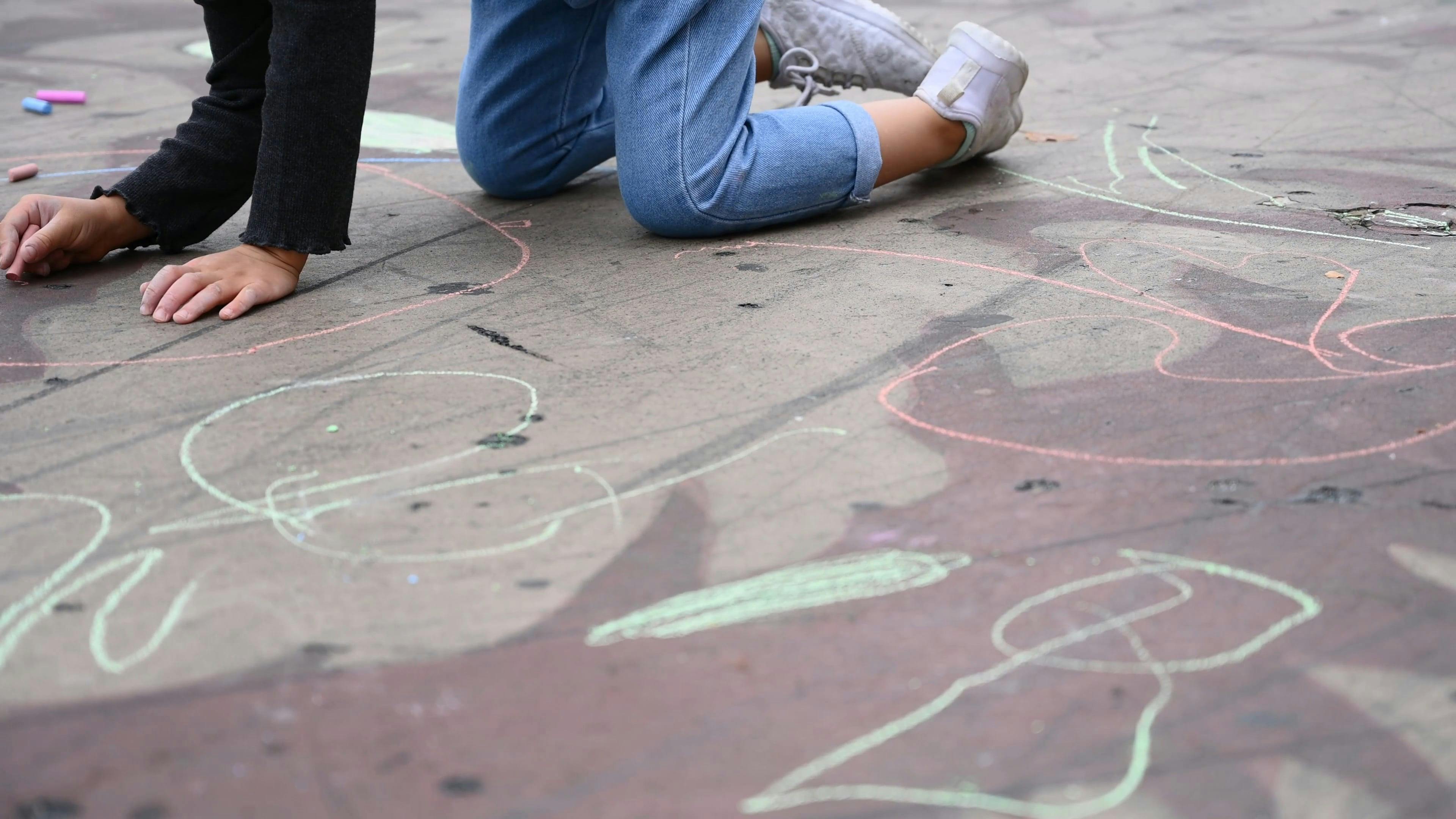 Children Playing with Colored Chalk · Free Stock Video
