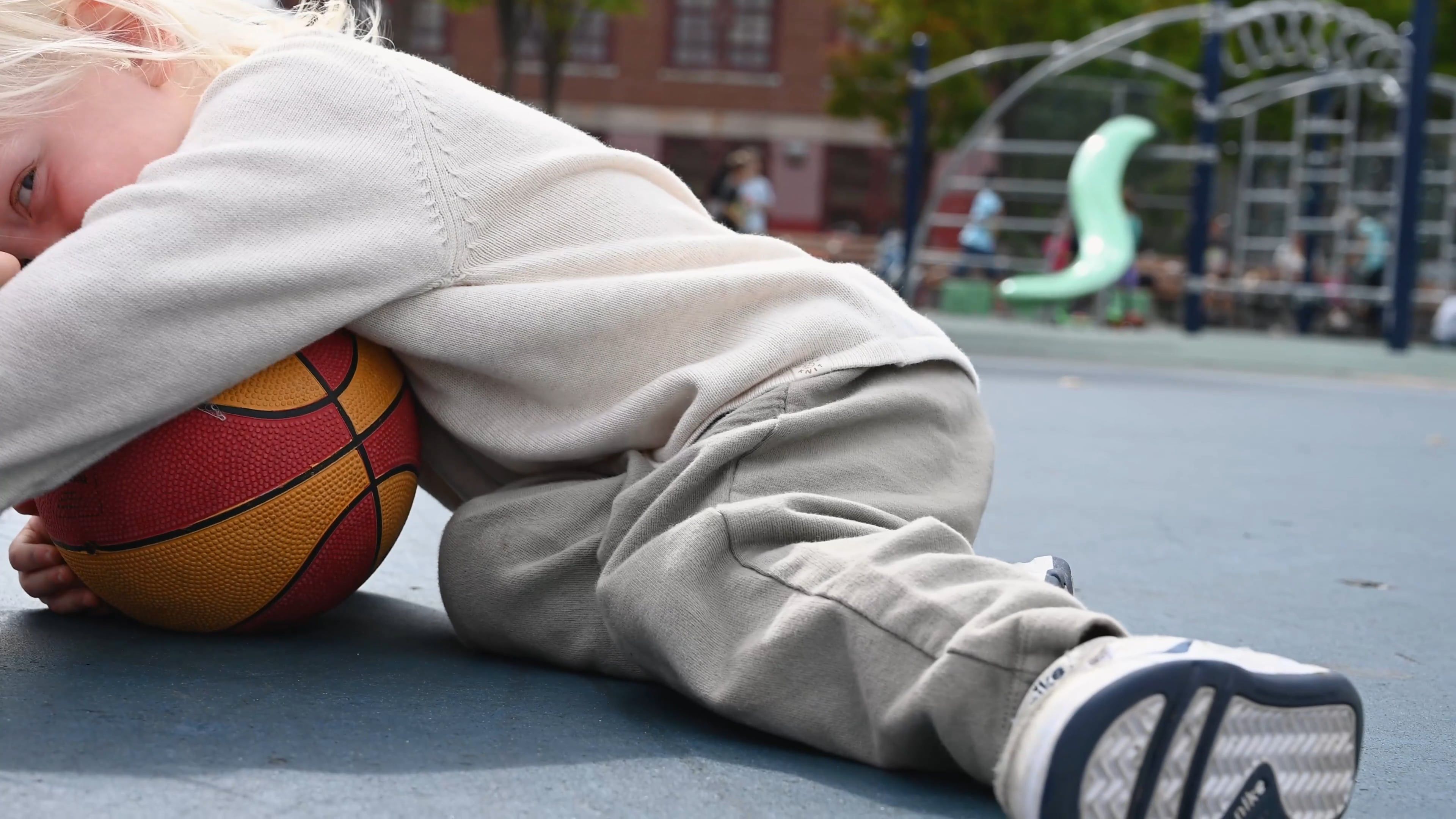 Child Hugging Basketball Ball Free Stock Video Footage, Royalty-Free 4K ...