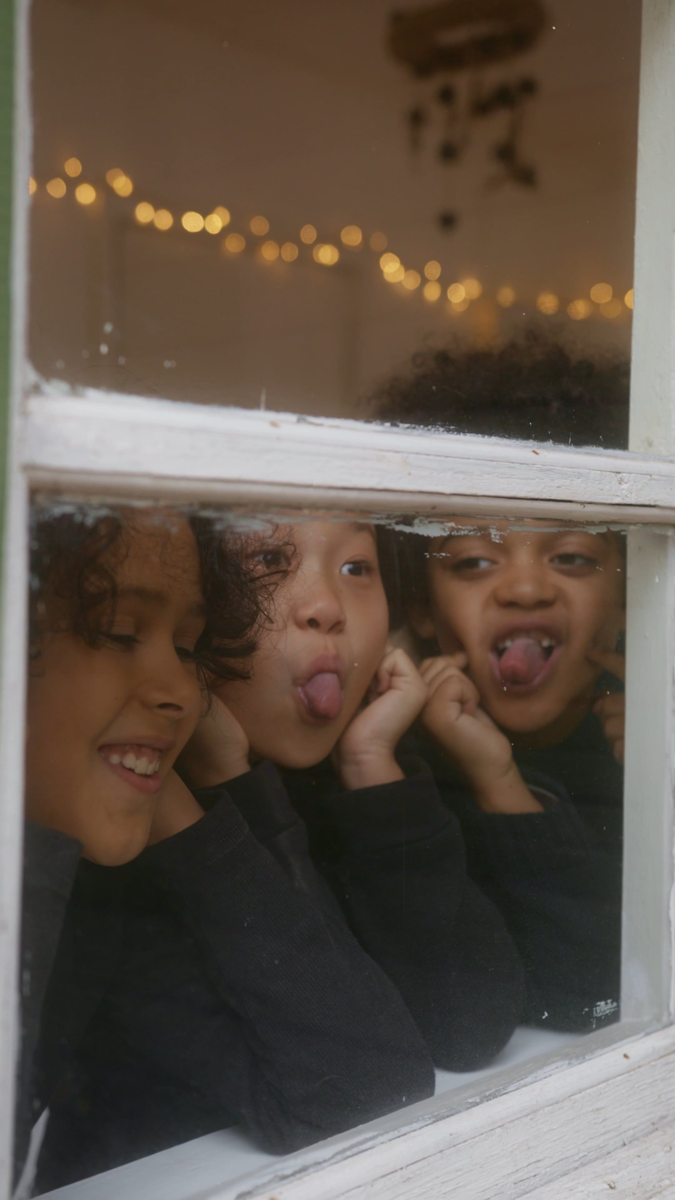 Kids Making Wacky Faces Through The Window Free Stock Video Footage ...