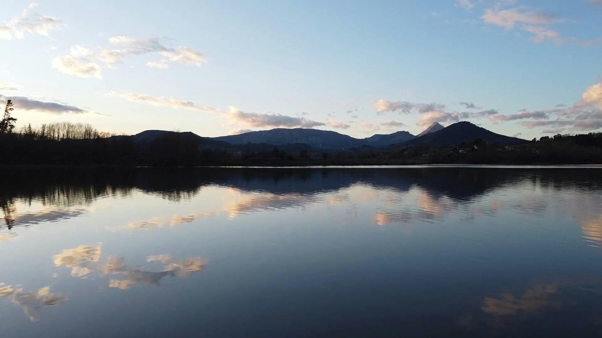 A Scenery of Placid Lake Across the Mountains Free Stock Video Footage ...