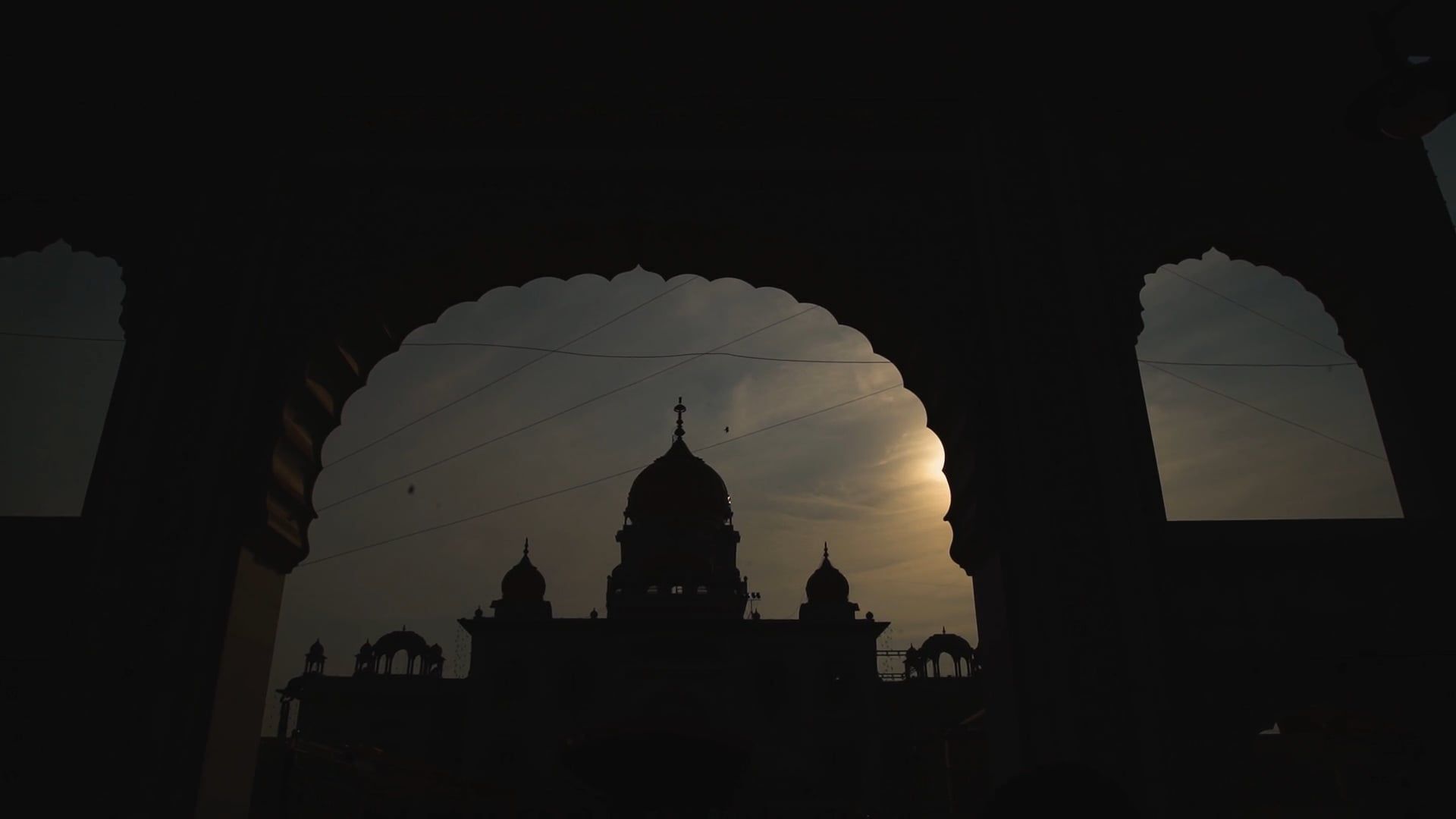 A Mosque In A Silhouetted Shot During Sunset · Free Stock Video