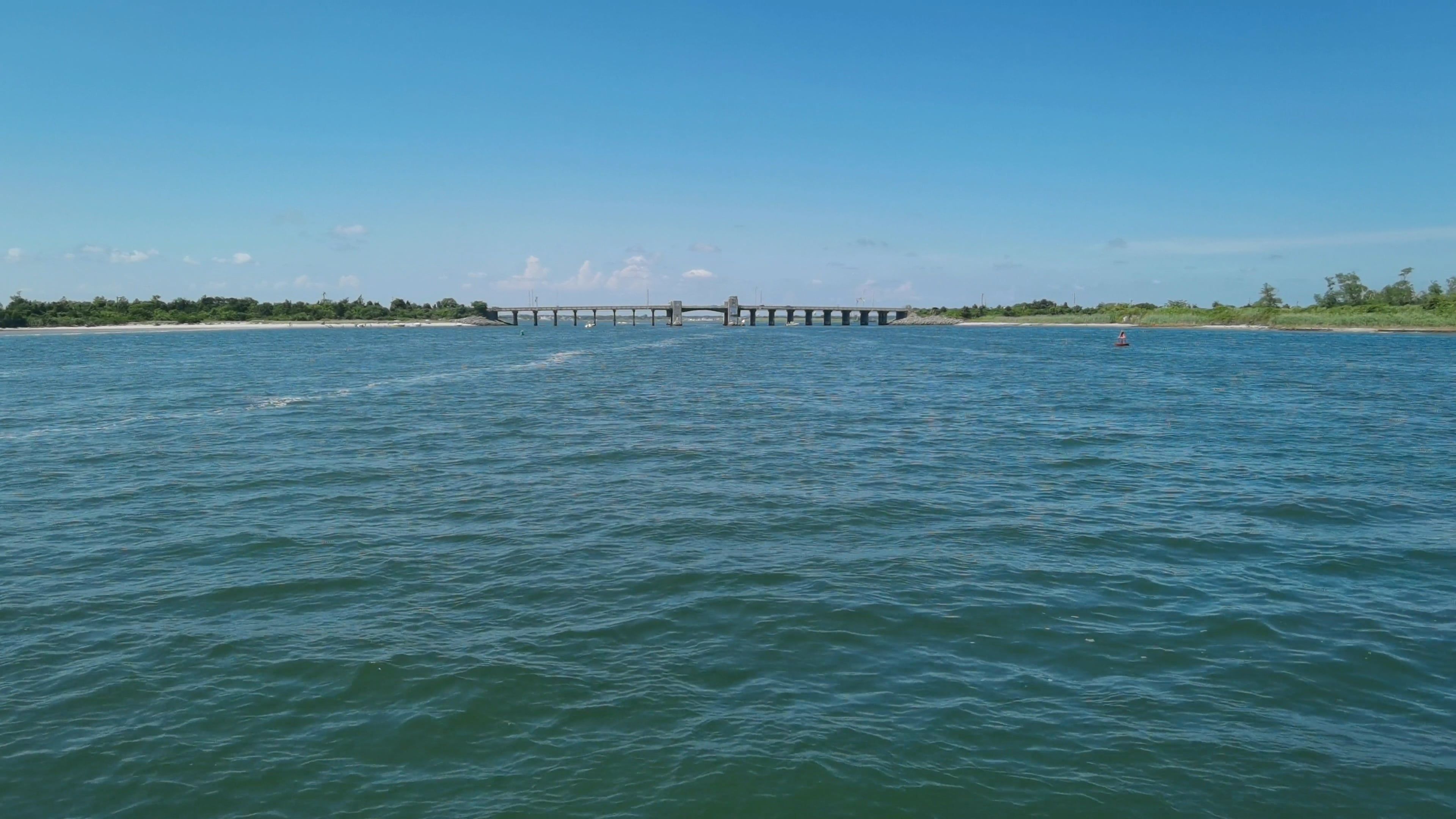 Scenery of Seascape Across the Bridge Under Blue Sky Free Stock Video ...