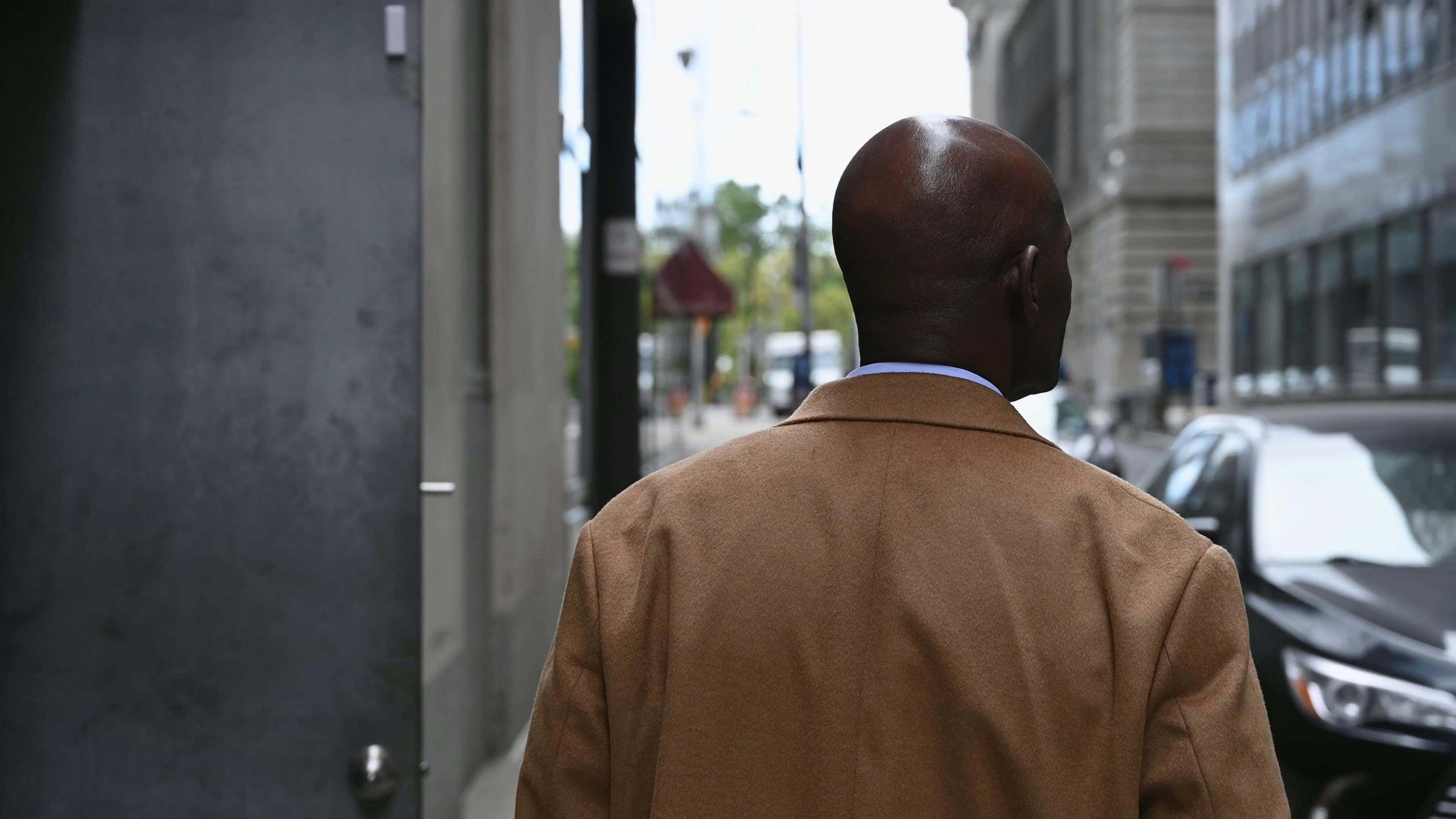 Back View of Man Walking in Street · Free Stock Video