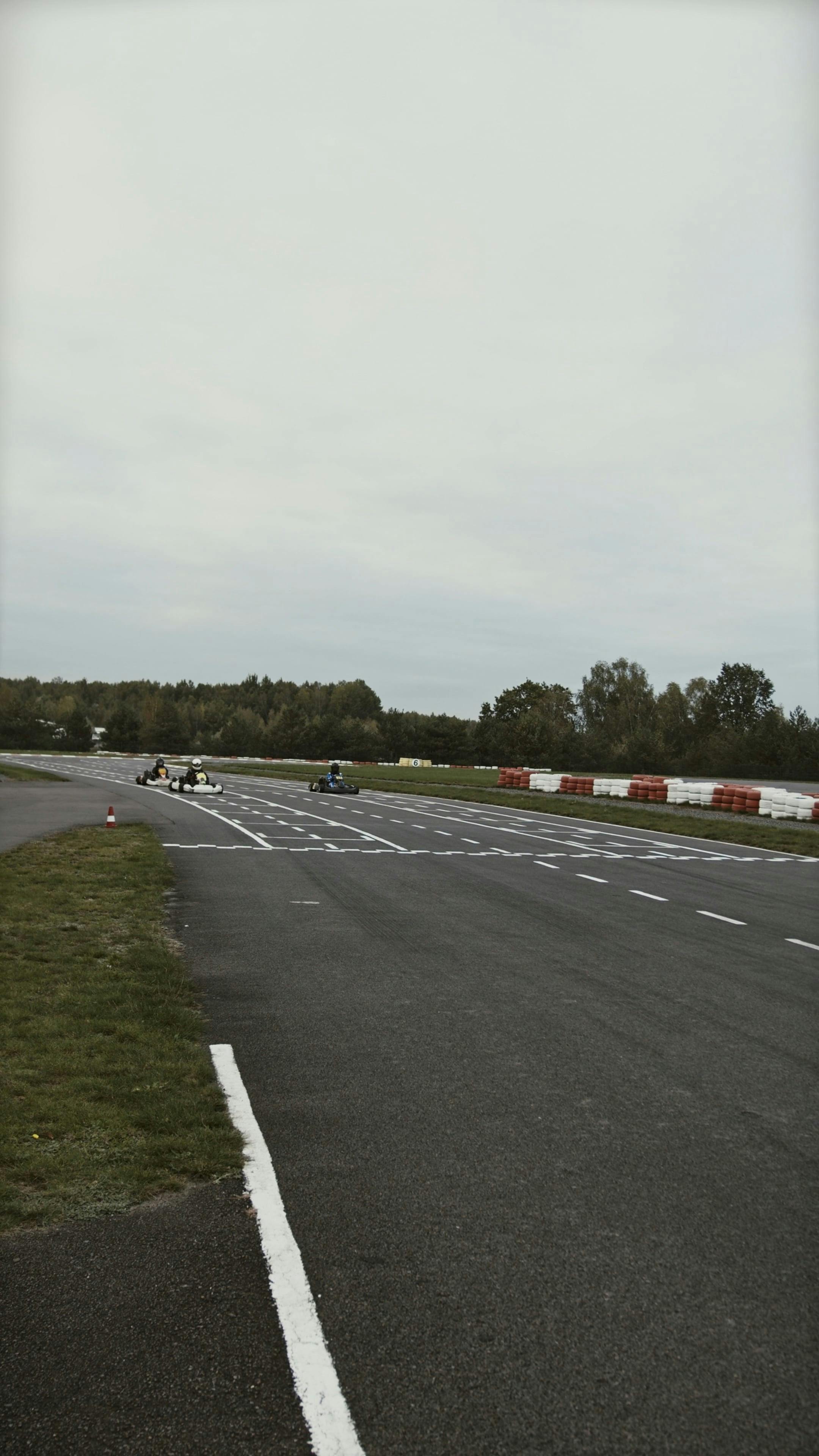 Drivers Racing on a Race Track with Karts Free Stock Video Footage ...