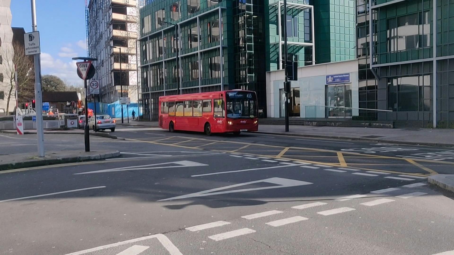 Video of a Red Bus on the Road · Free Stock Video