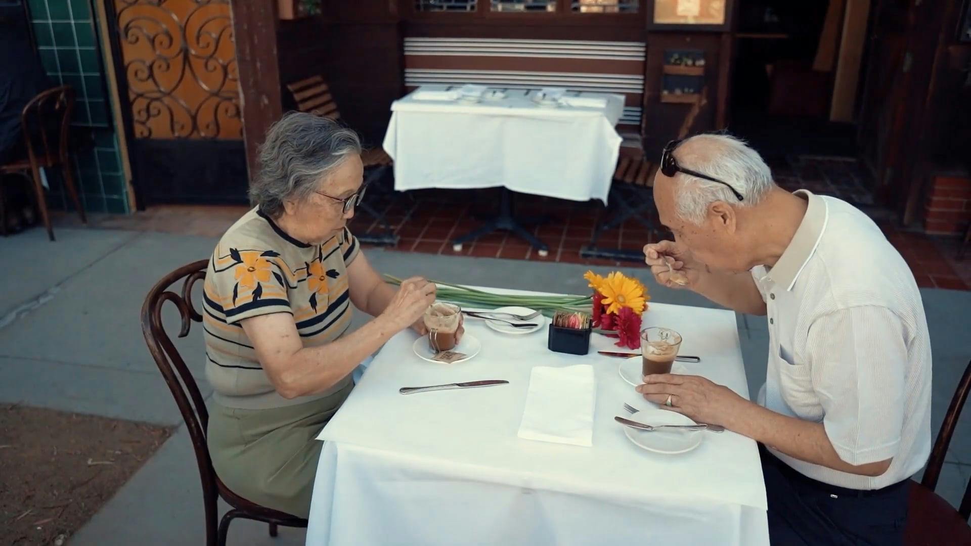 An Elderly Couple Eating In An Outdoor Restaurant · Free Stock Video