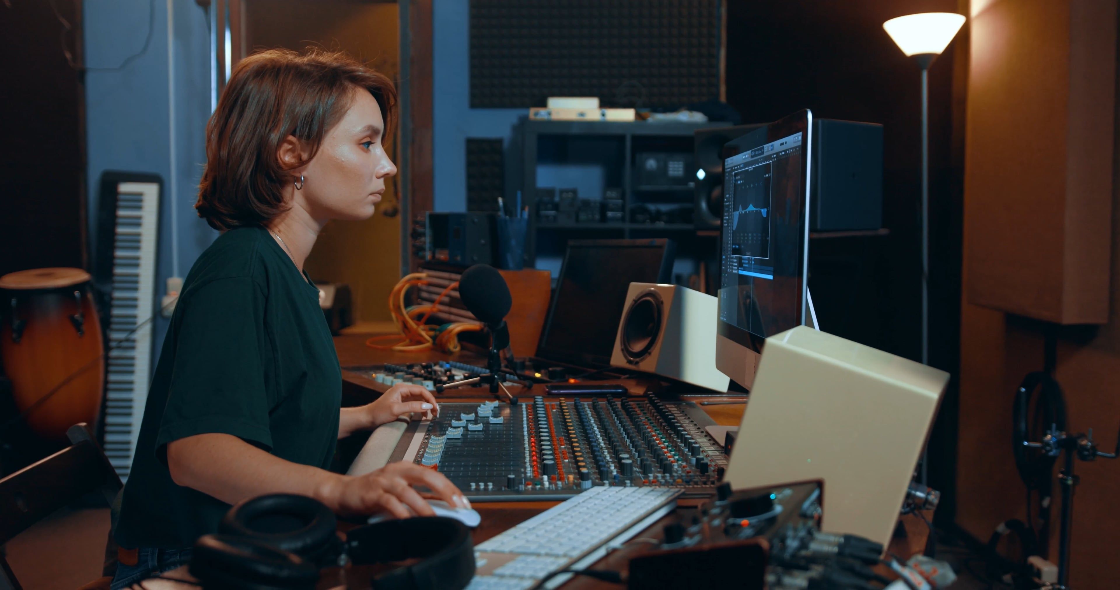 A Woman Working as a Sound Engineer · Free Stock Video