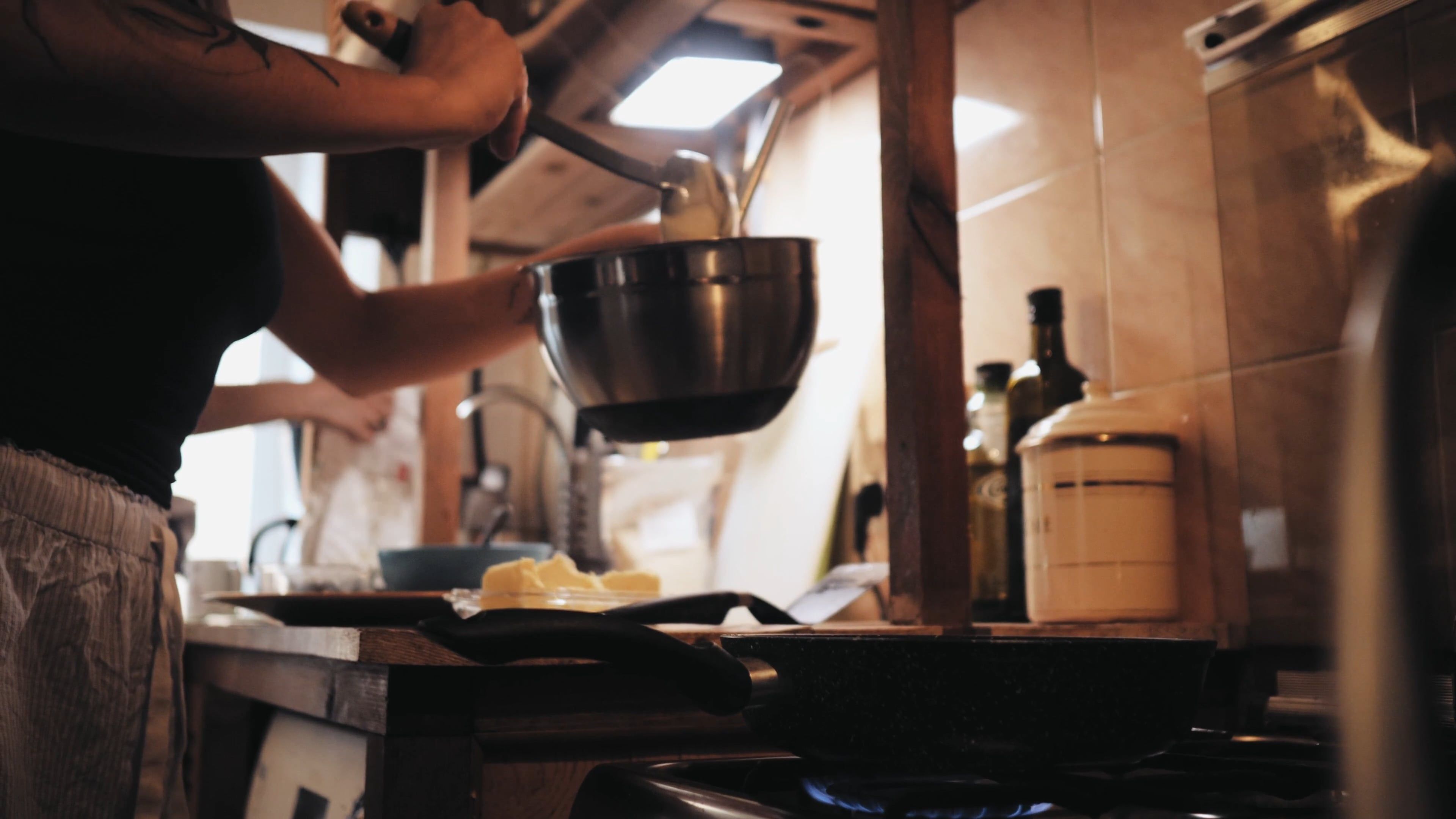 A Woman Cooking on a Frying Pan Free Stock Video Footage, Royalty-Free ...