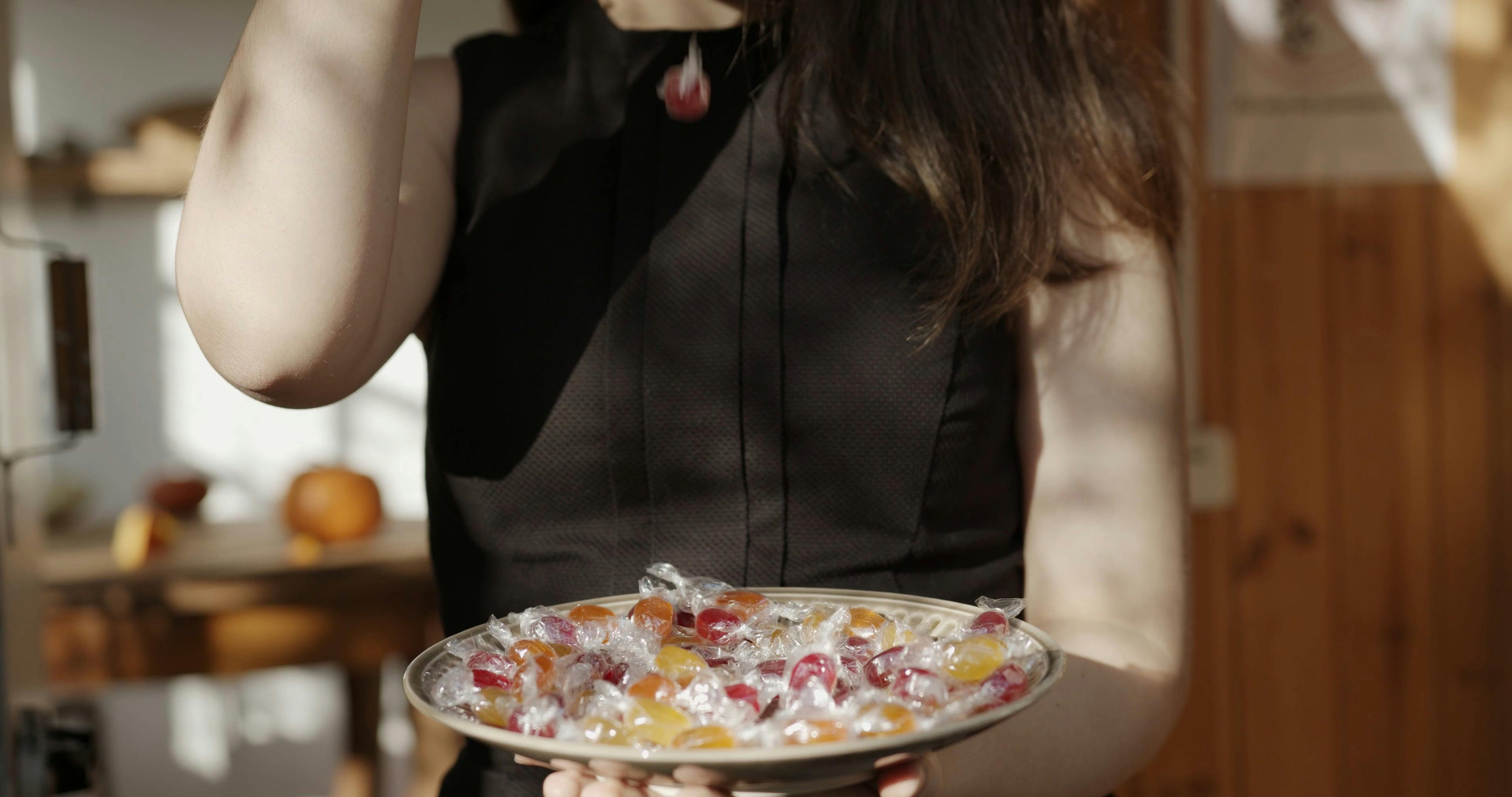 Dropping Candies Over A Plate Free Stock Video Footage, Royalty-Free 4K ...