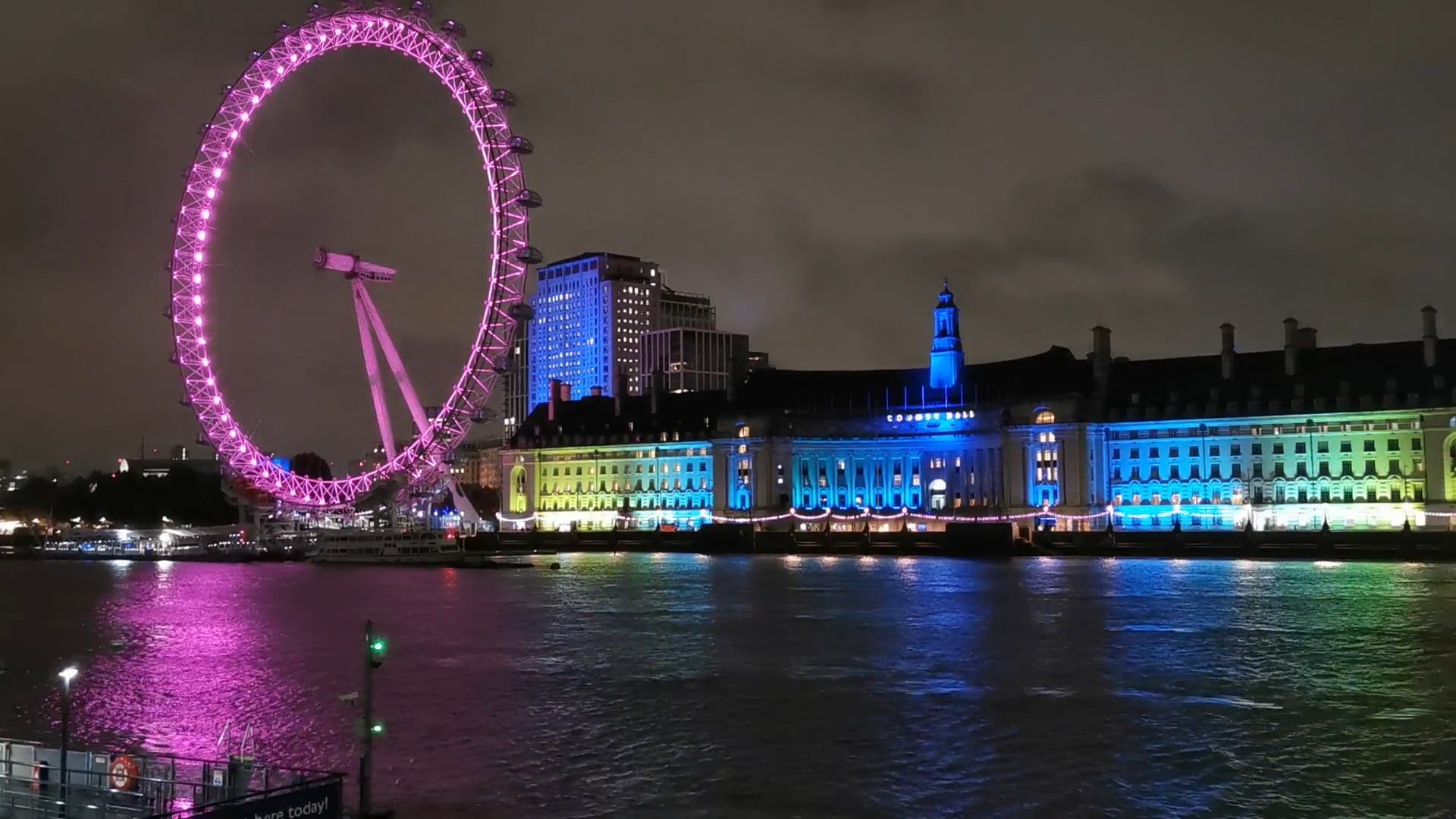 Overlooking view of London Eye and Thames River · Free Stock Video