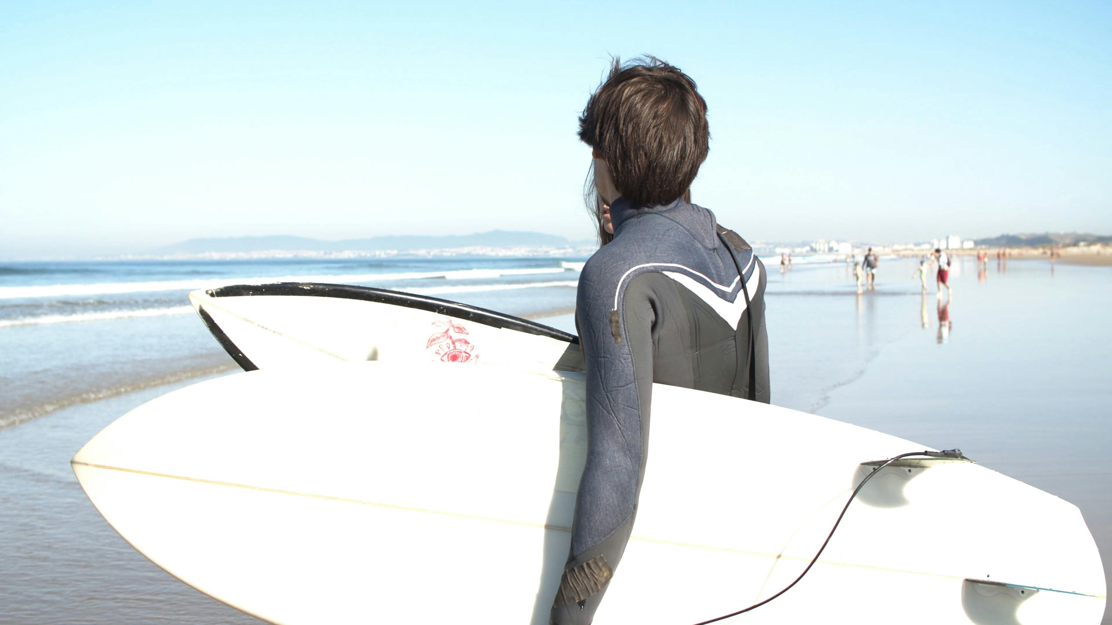 People Carrying Surfboard Talking · Free Stock Video