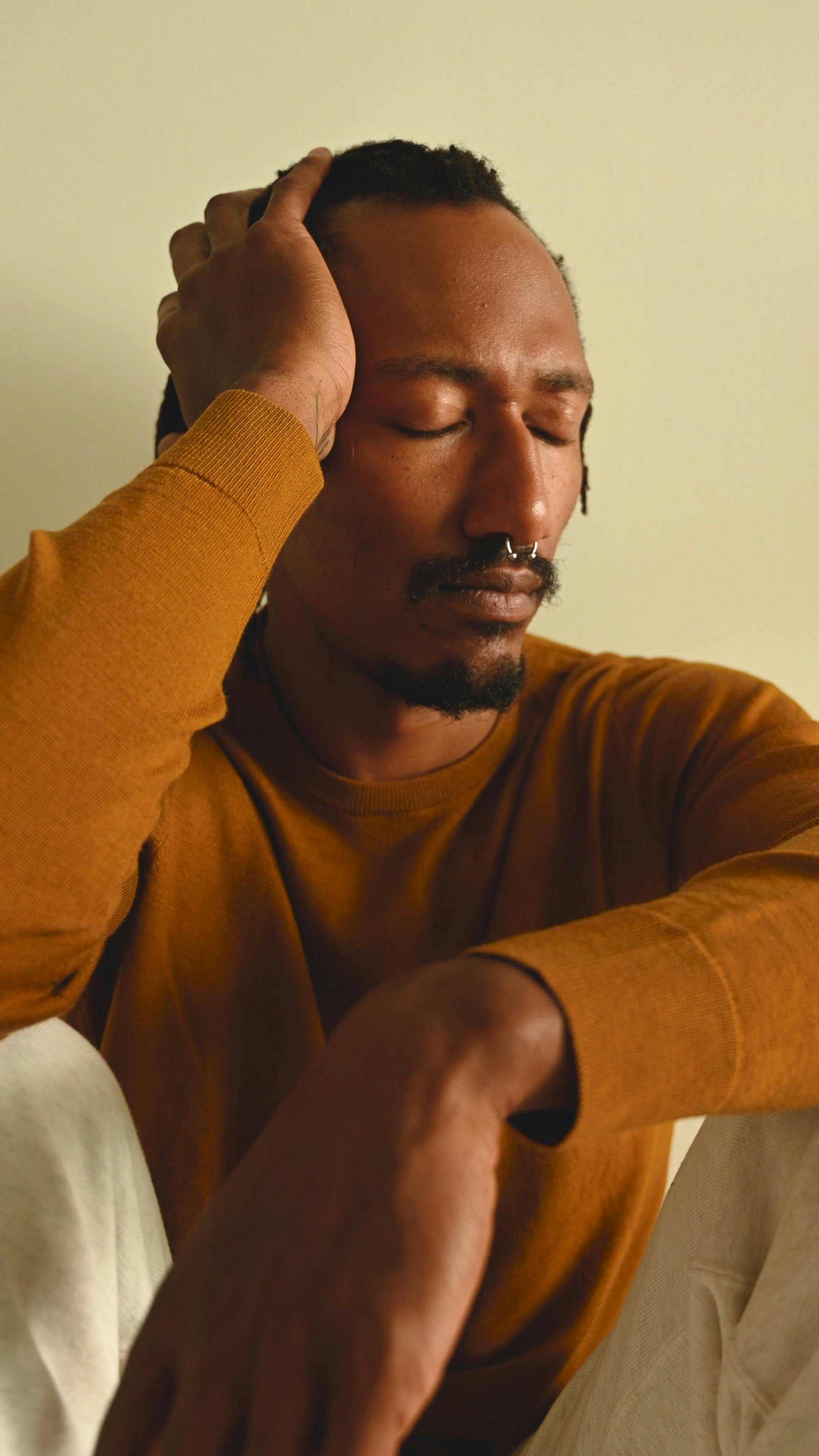 Man Quietly Sitting and Thinking · Free Stock Video