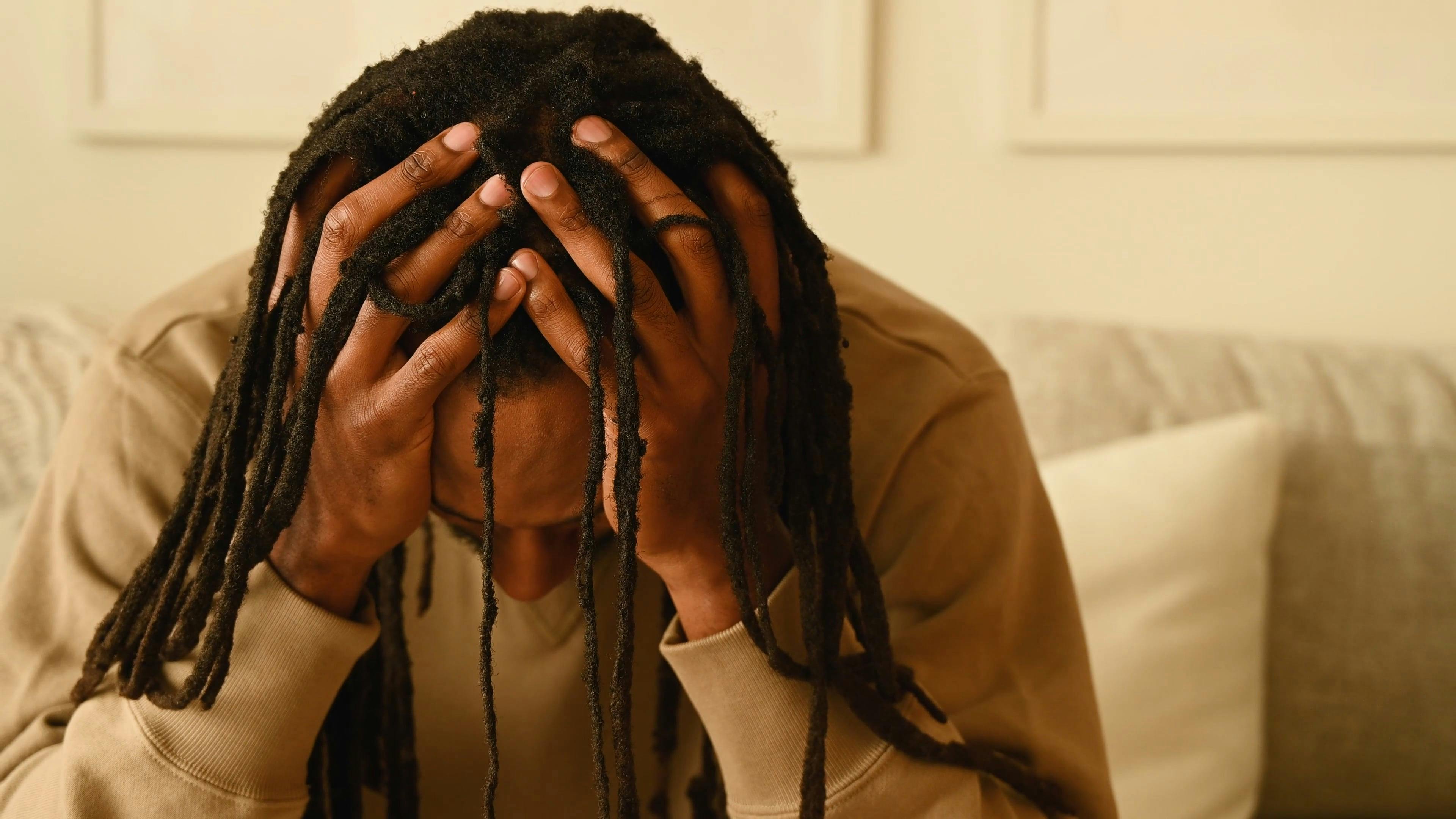 Problematic Man Sitting on Sofa · Free Stock Video