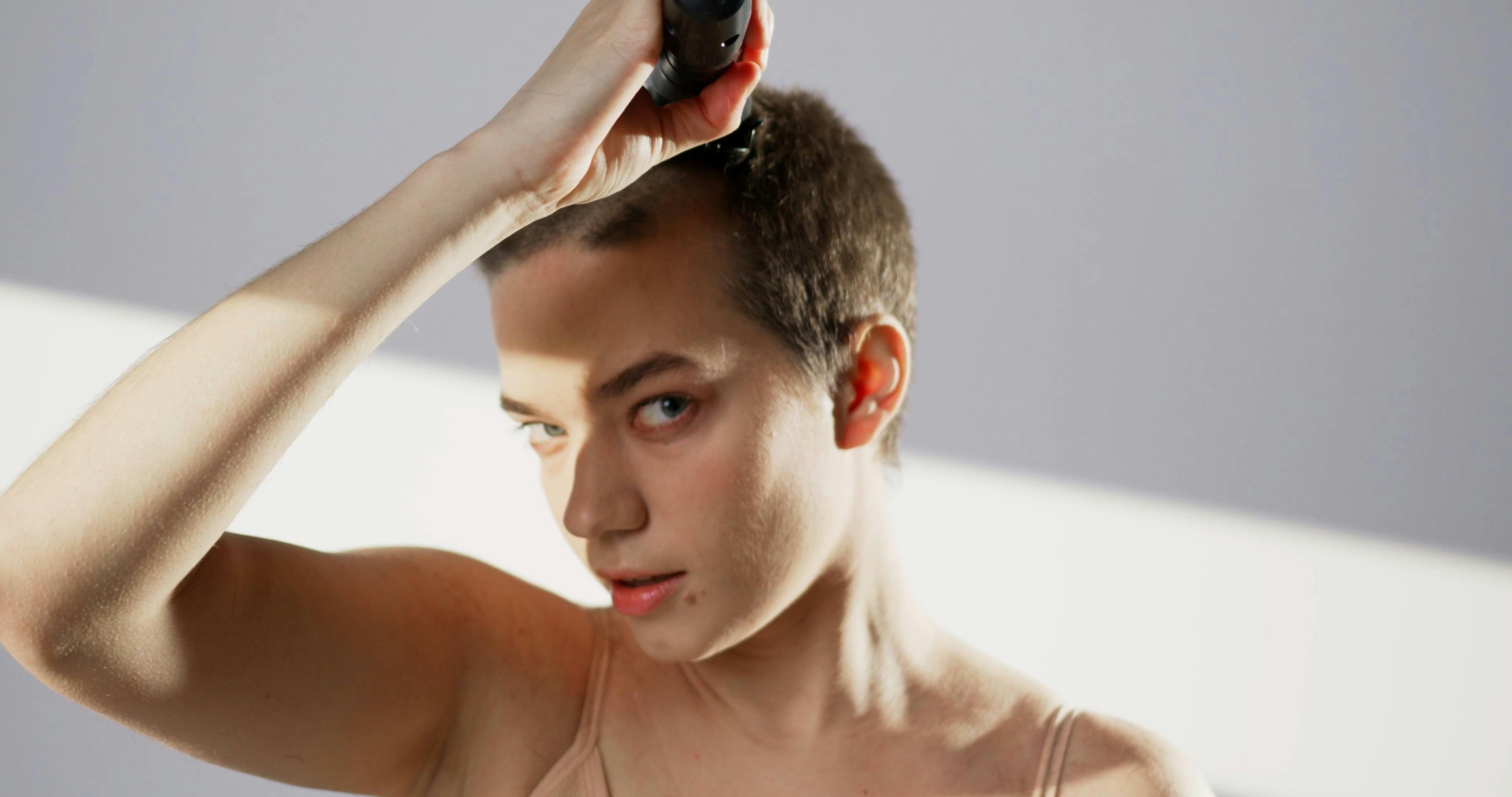 A Woman Shaving Her Hair Free Stock Video Footage, Royalty-Free 4K & HD ...