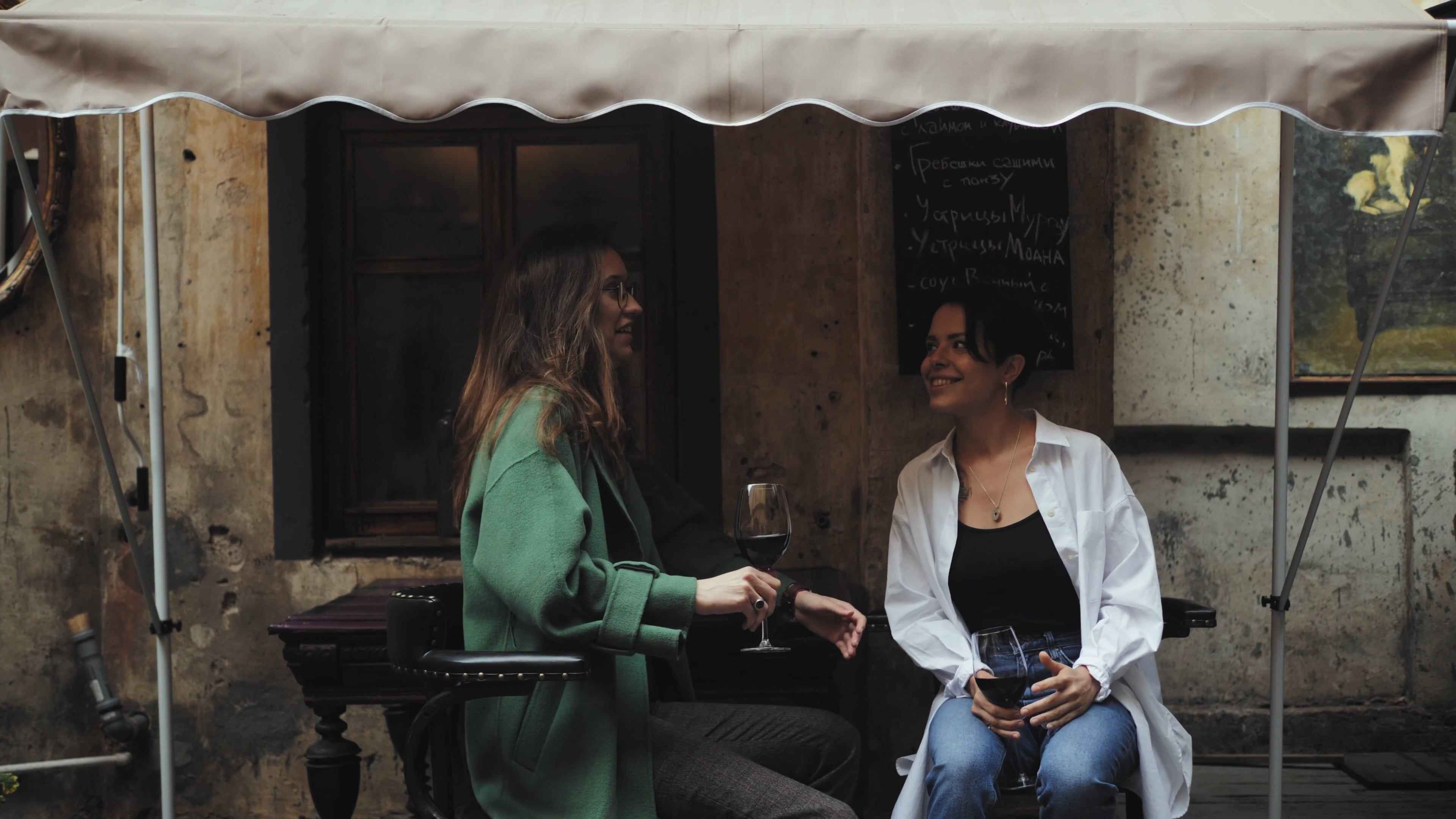 Women Dancing and Kissing with a Glass of WIne · Free Stock Video