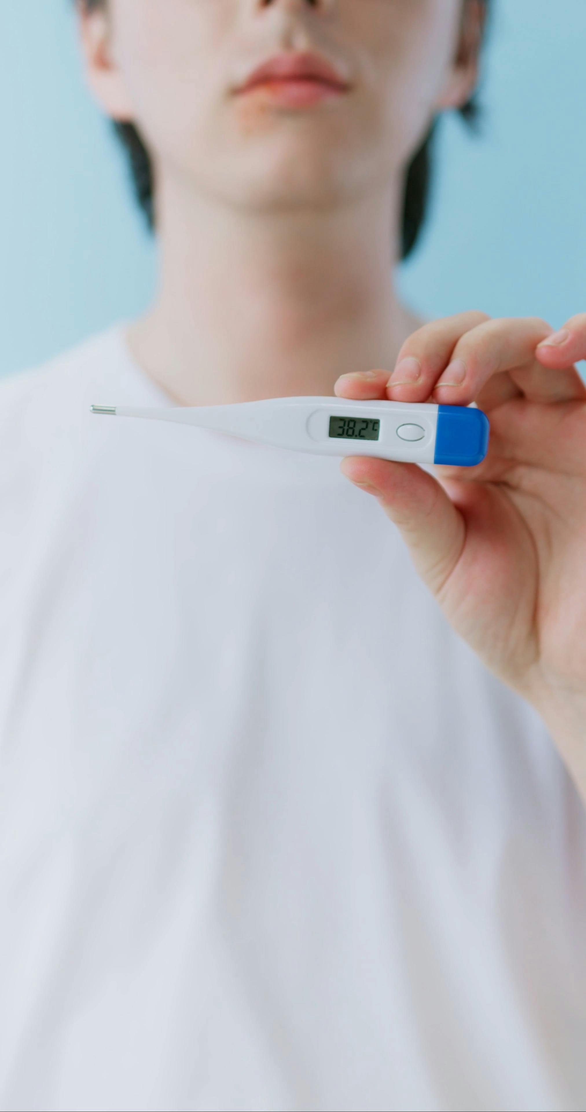 Guy wiht a Thermometer · Free Stock Video