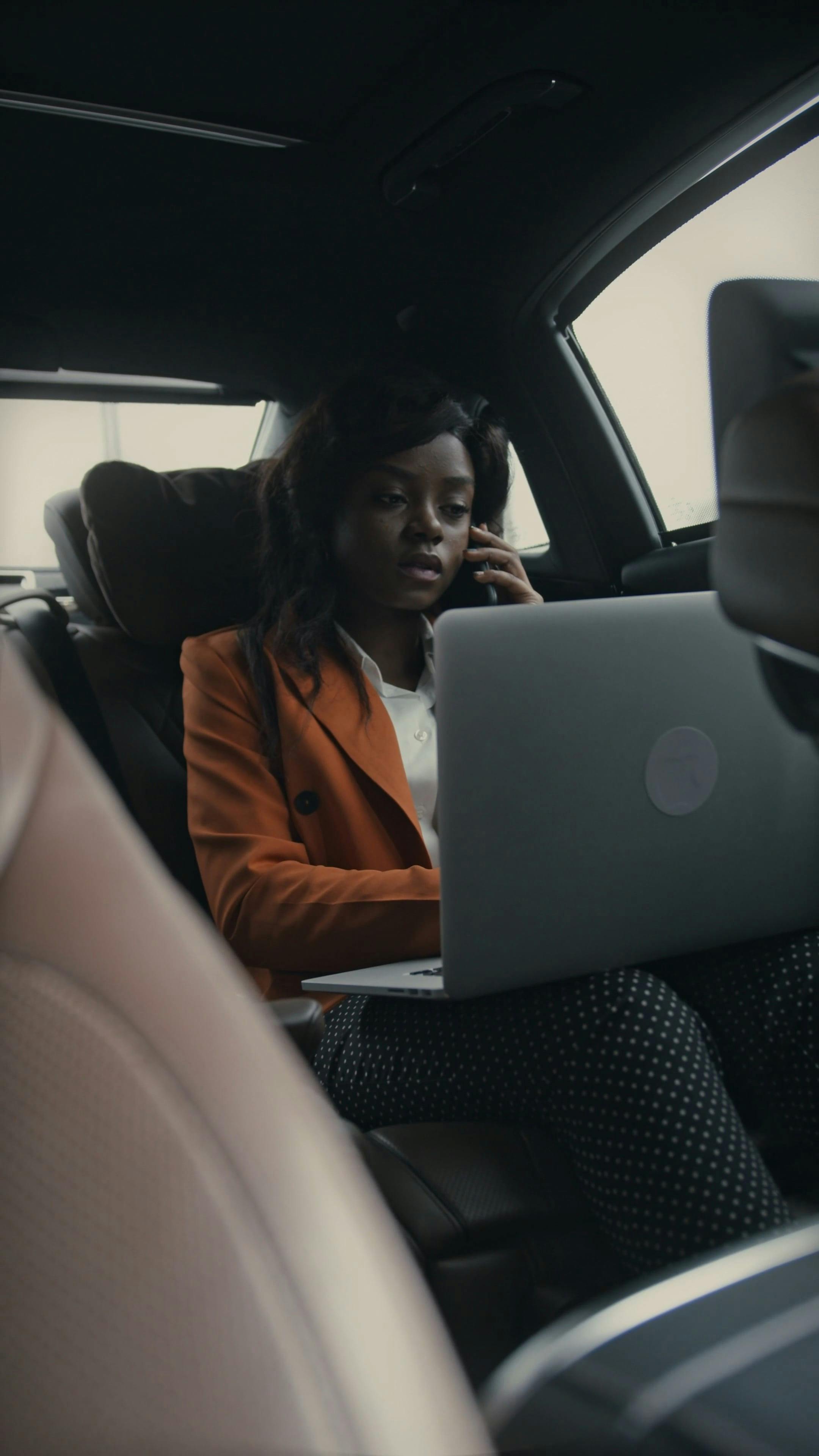 A Woman Working While Inside A Moving Car Free Stock Video Footage ...