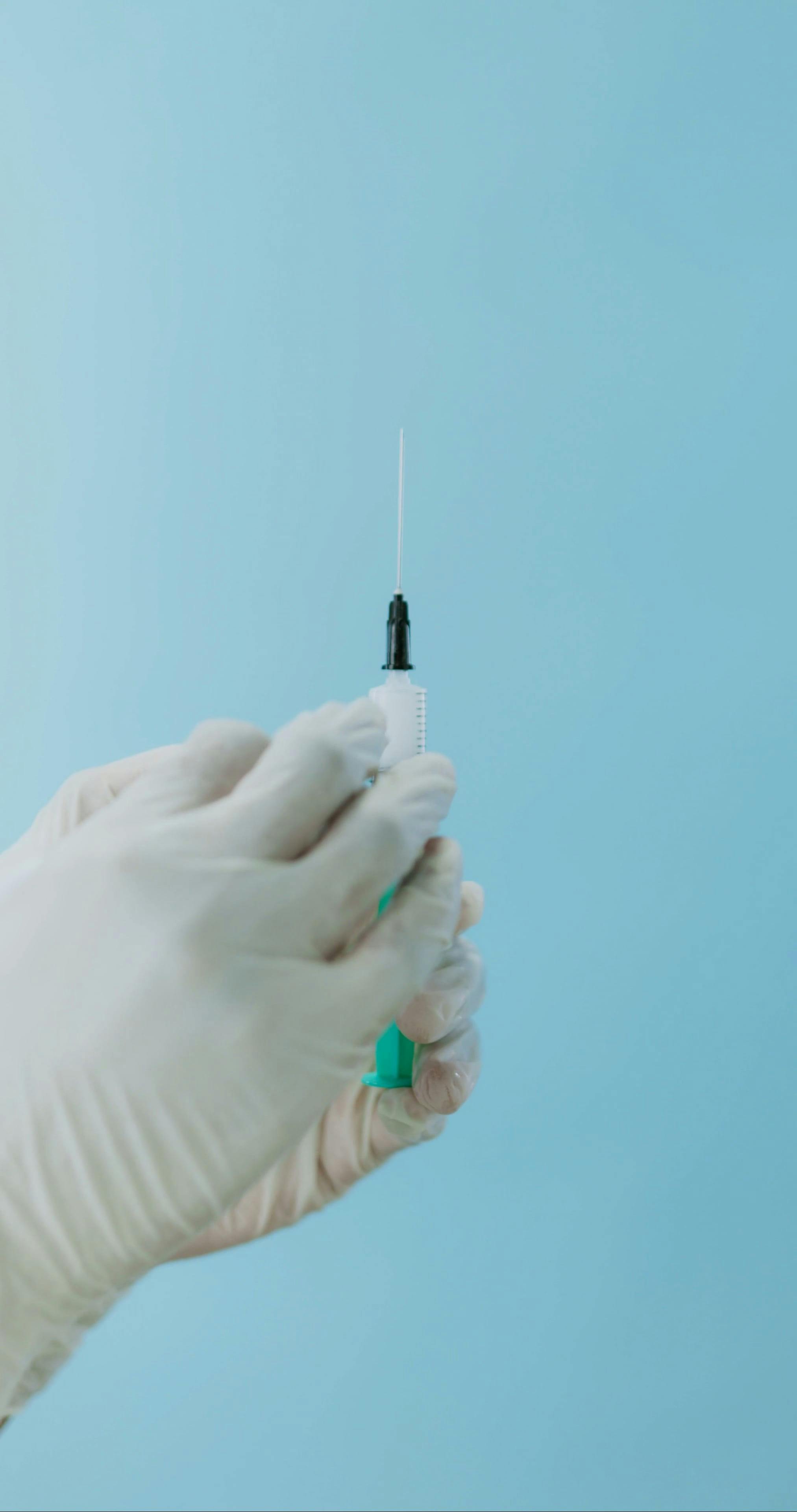 Person Getting a Syringe Ready for Vaccination Free Stock Video Footage ...