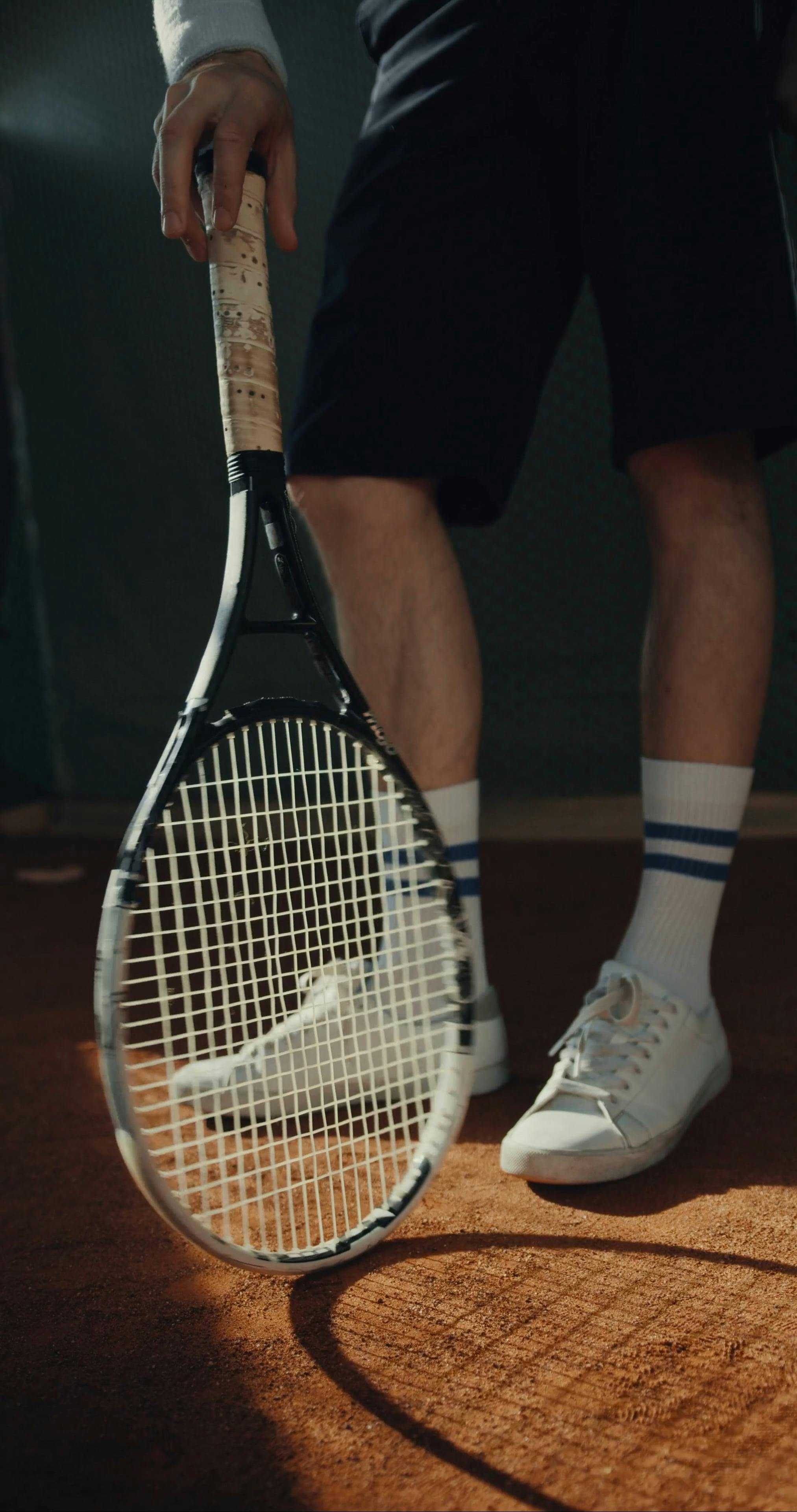 A Tennis Player Spinning His Racket · Free Stock Video
