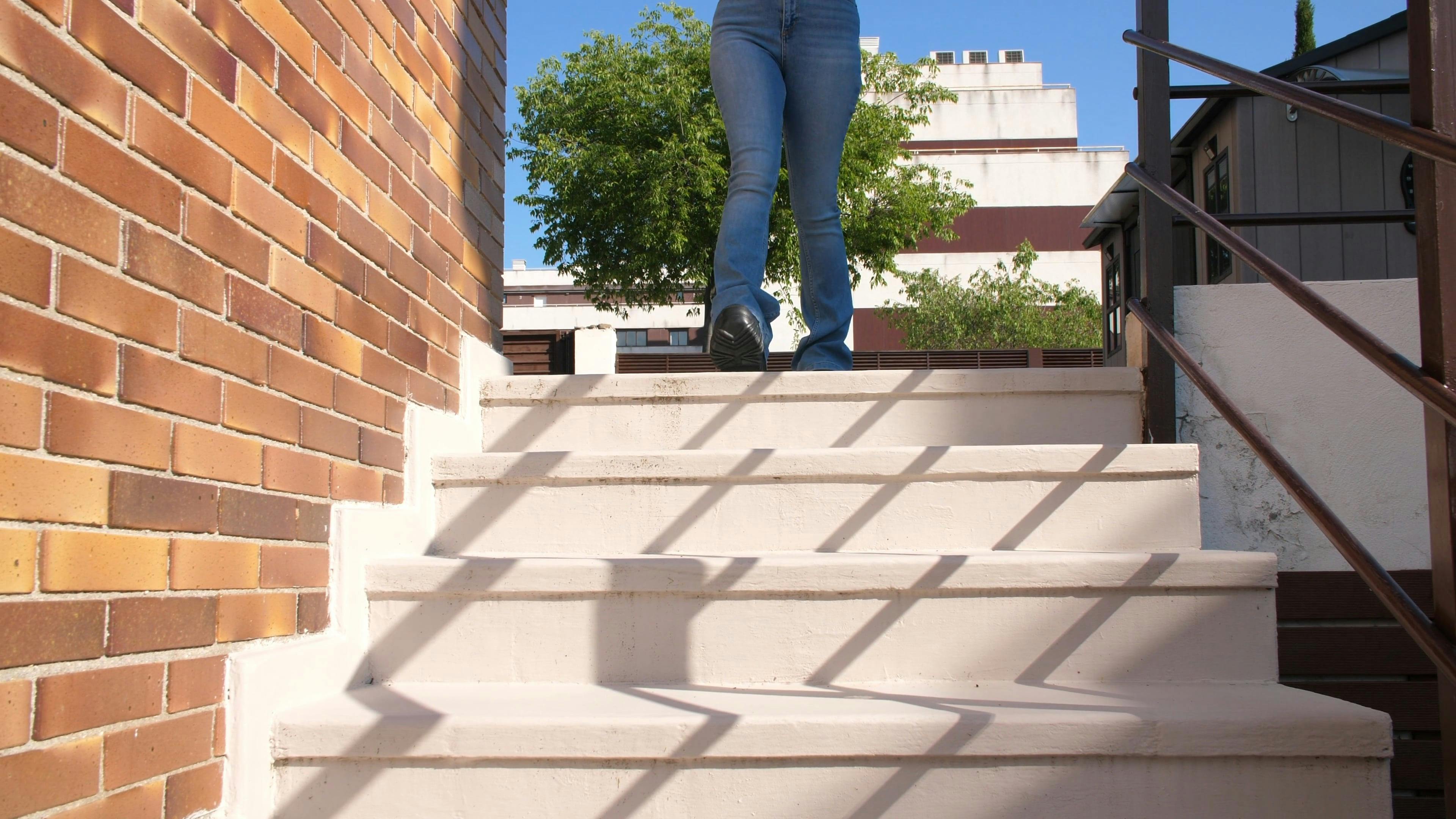 Person Going Down the Stairs · Free Stock Video