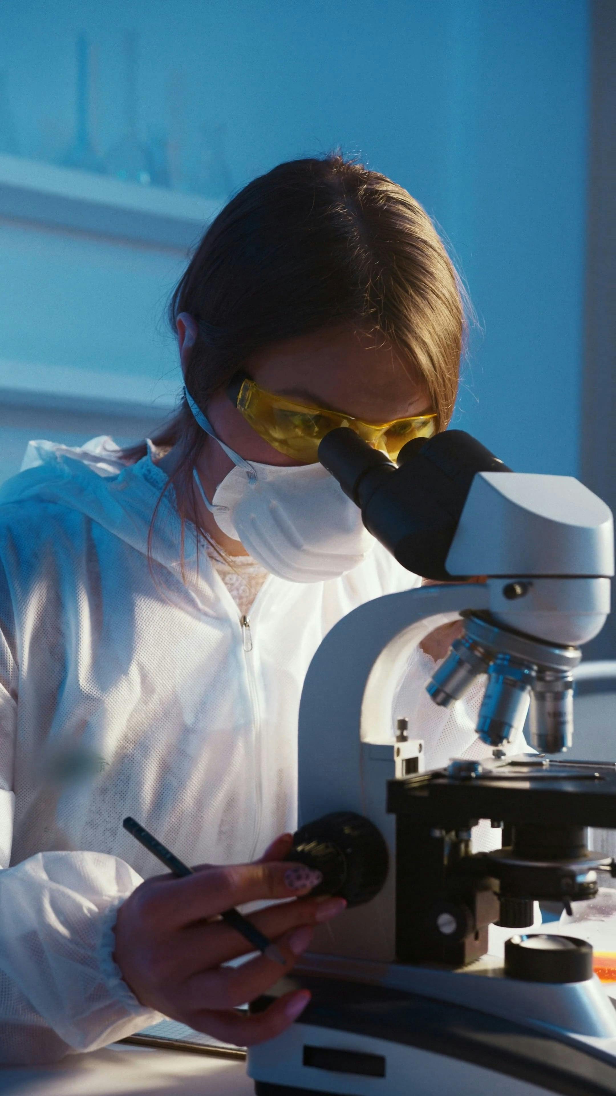 Person using Microscope · Free Stock Video