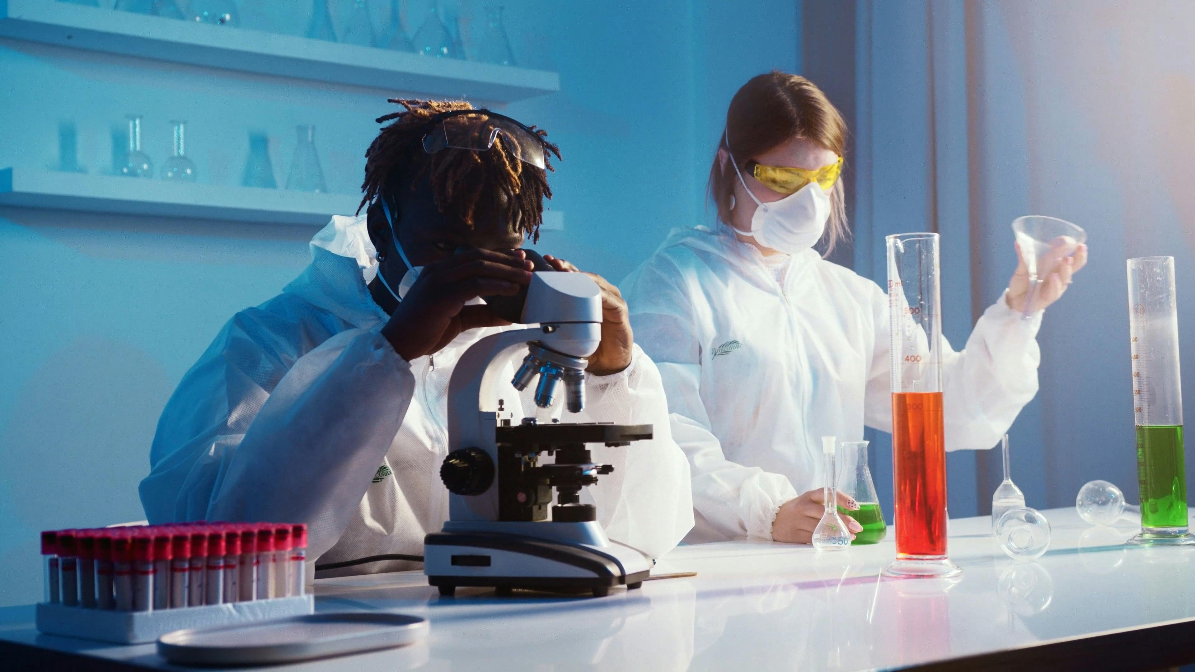 A Man and Woman Performing Experiment in a Lab · Free Stock Video