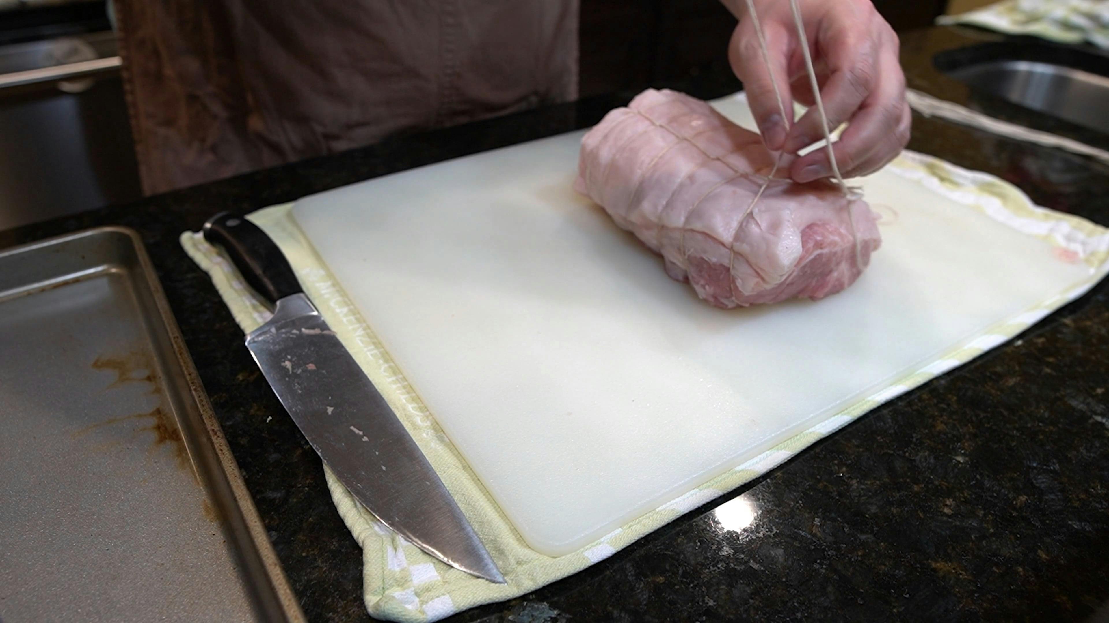 Person Tying Pork Belly Meat with Twine String Free Stock Video Footage ...