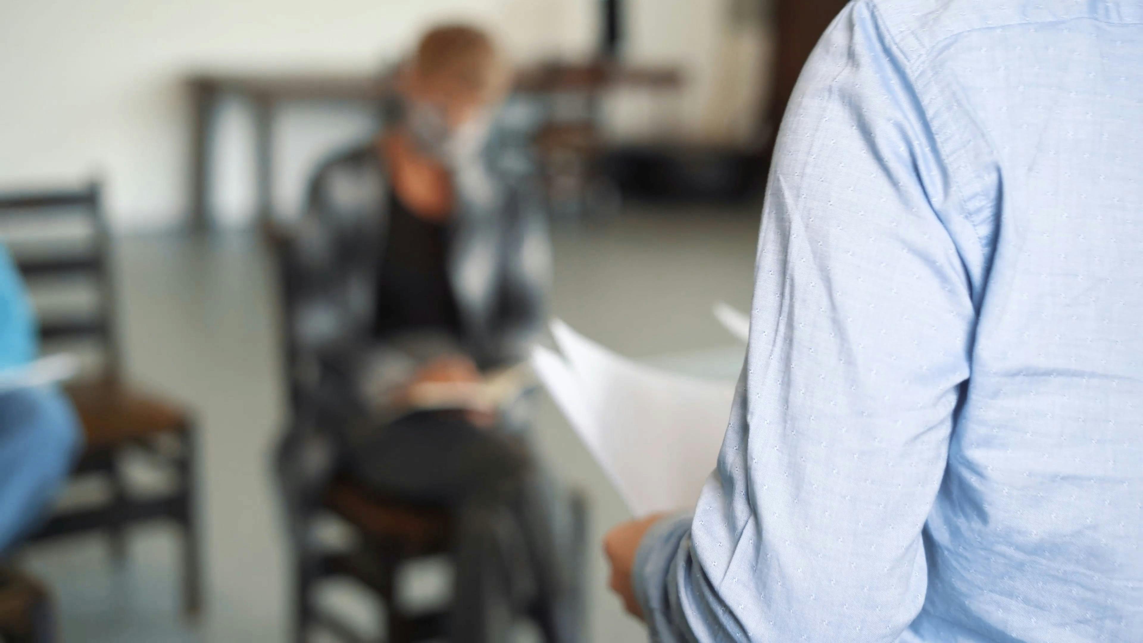 A Man Handing Off a Papers to the Elder People Free Stock Video Footage ...
