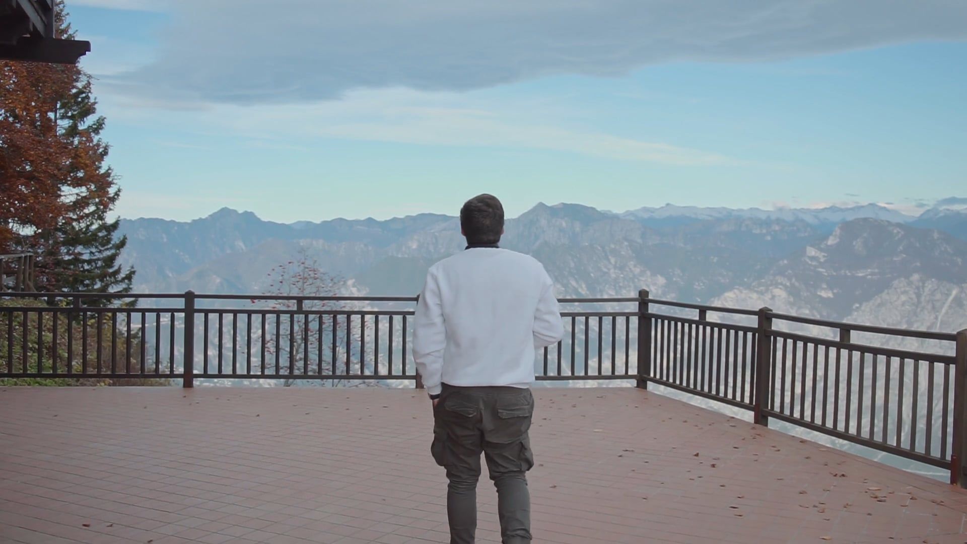 A Man Taking Pictures of a Beautiful Scenery from a Viewing Platform ...