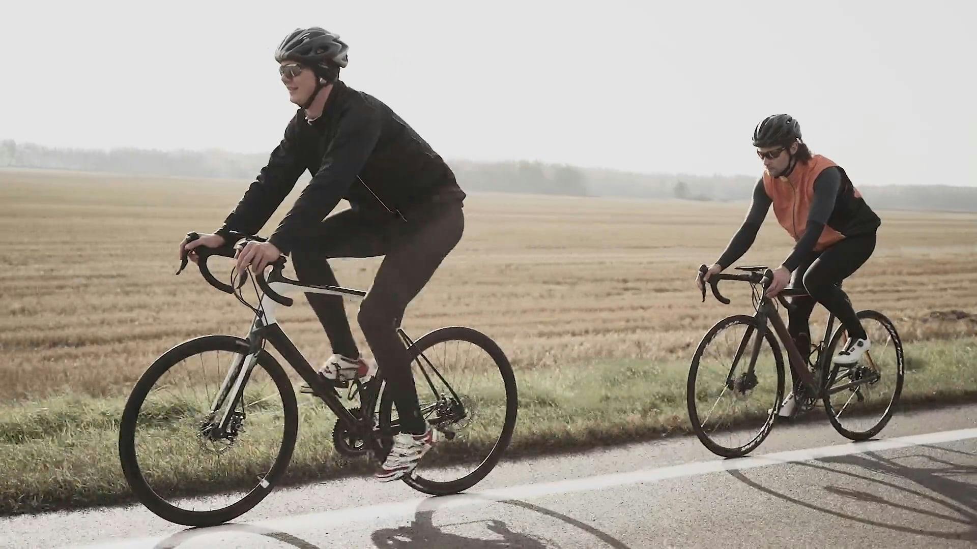 Three Cyclists on Road · Free Stock Video