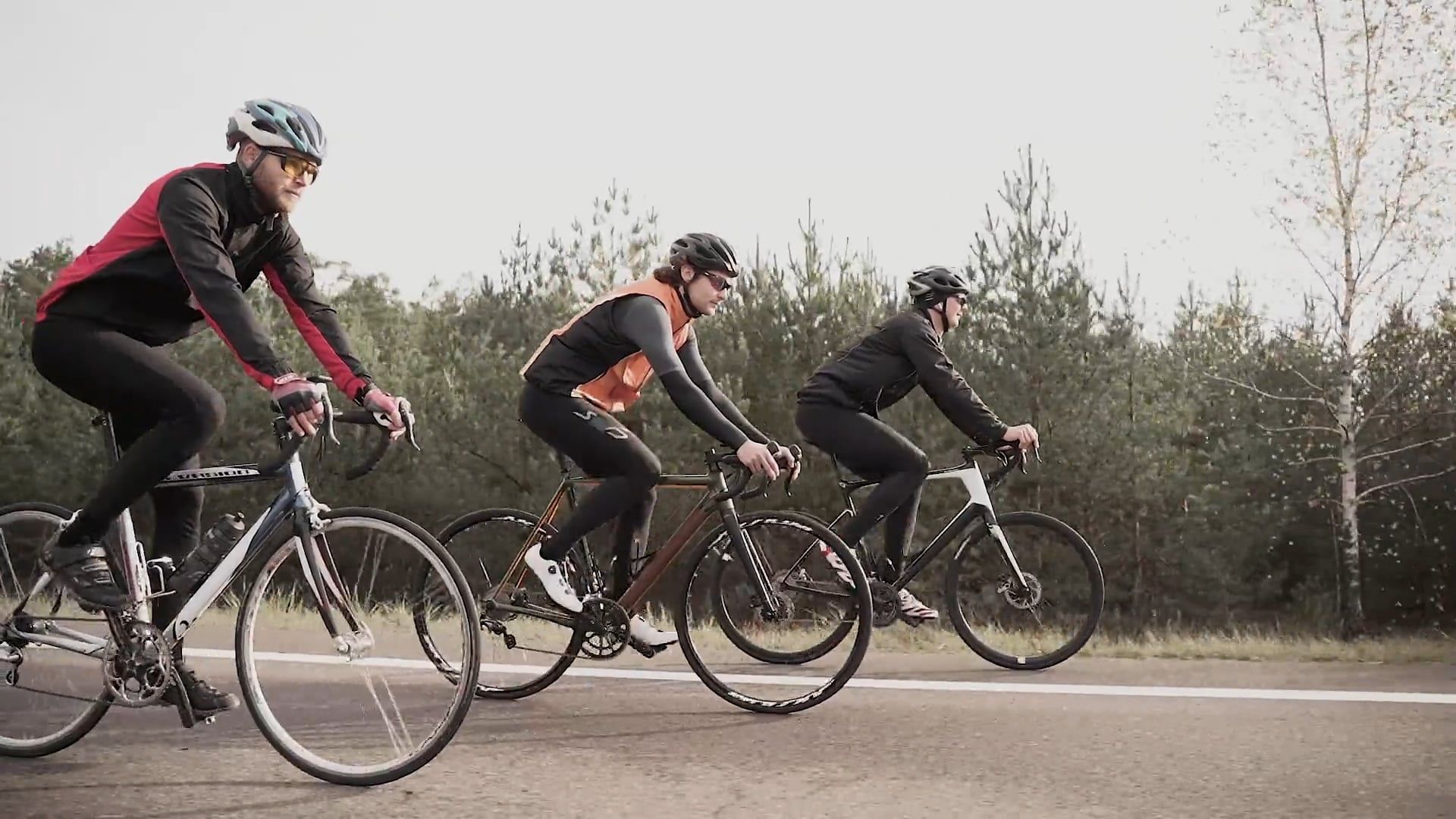 Three Cyclists on Road · Free Stock Video