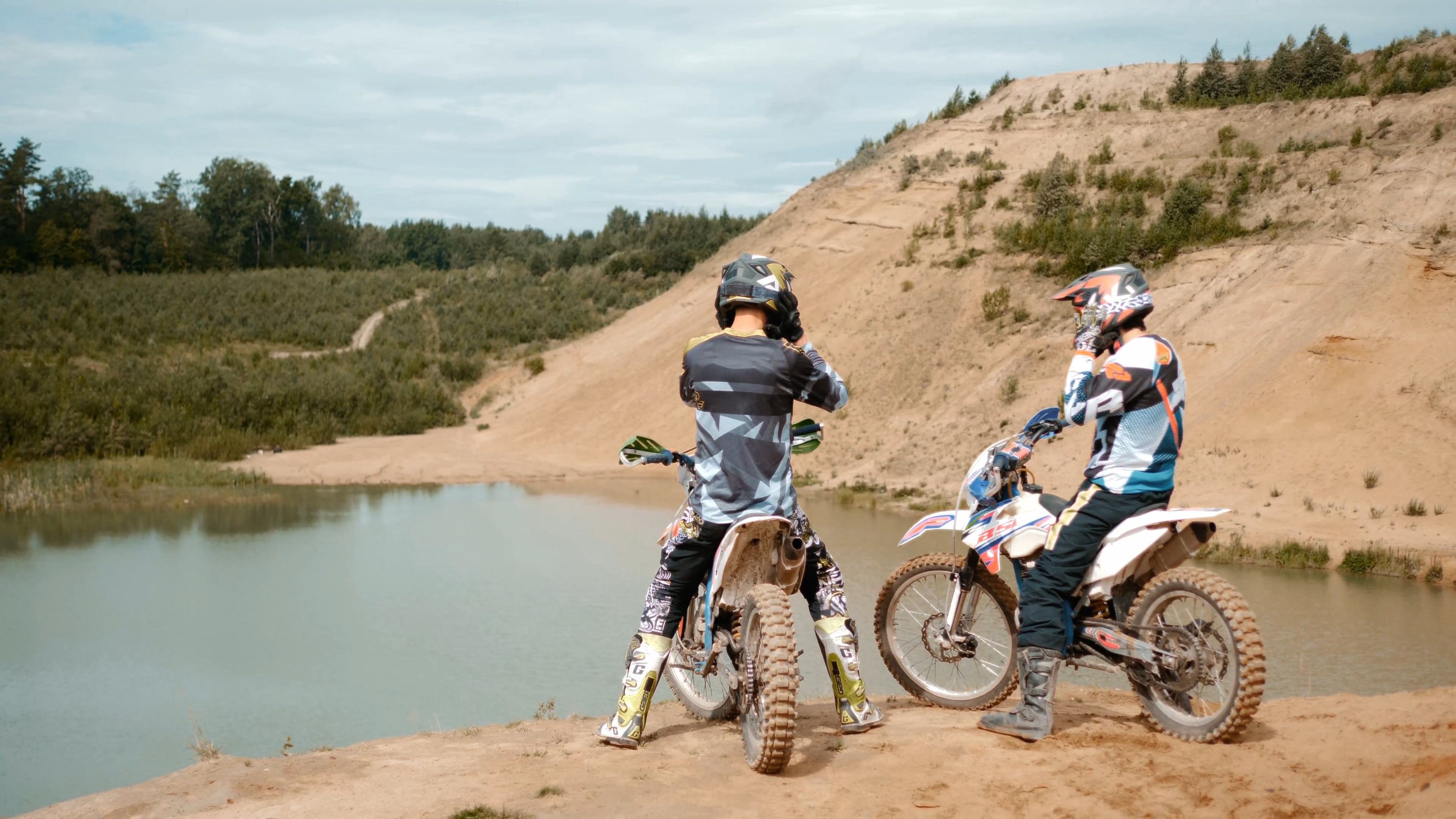 Two Men Riding a Dirt Bike · Free Stock Video